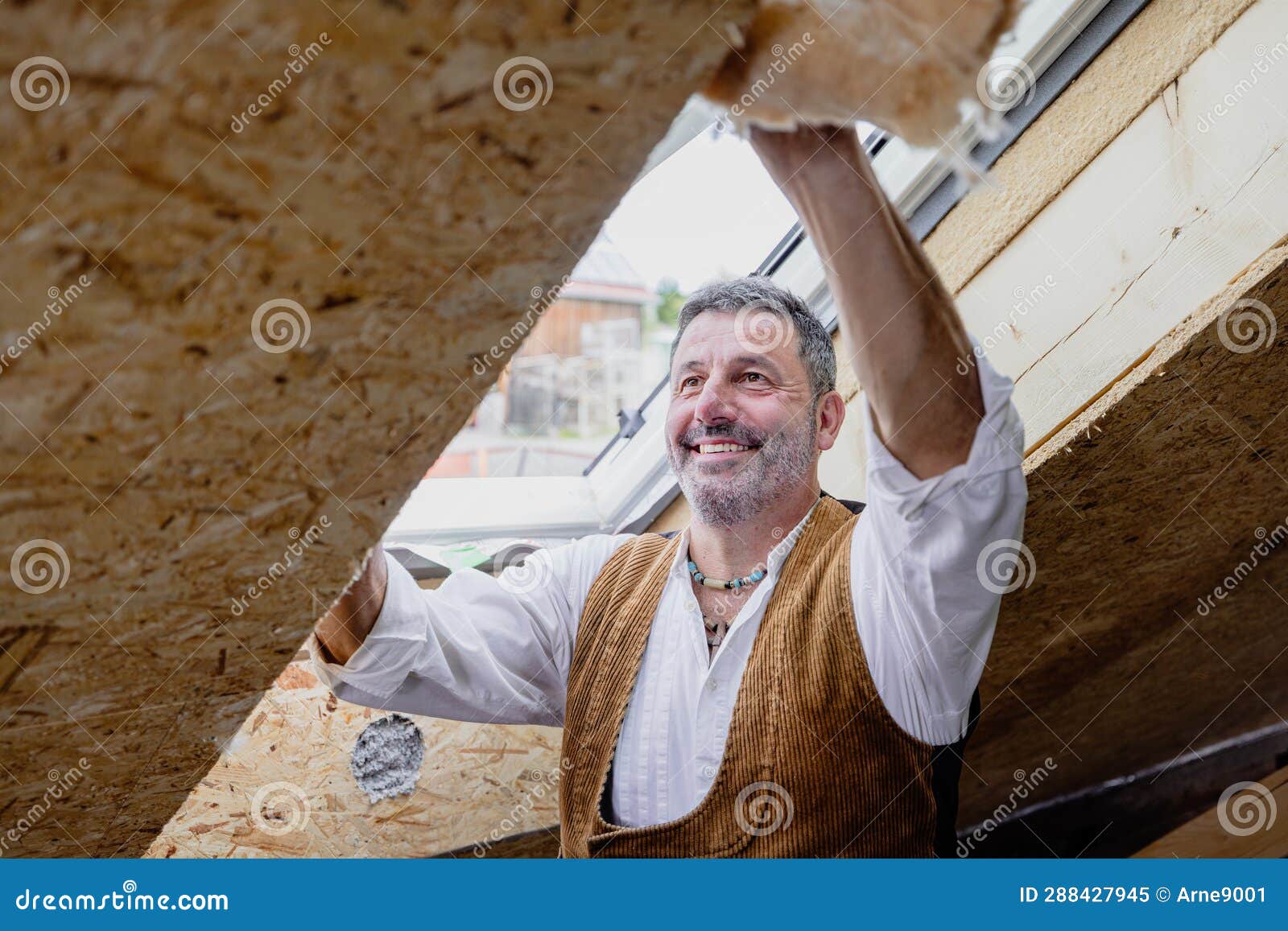 Carpenter Fixing Insulation Material on Roof Window Stock Image - Image ...
