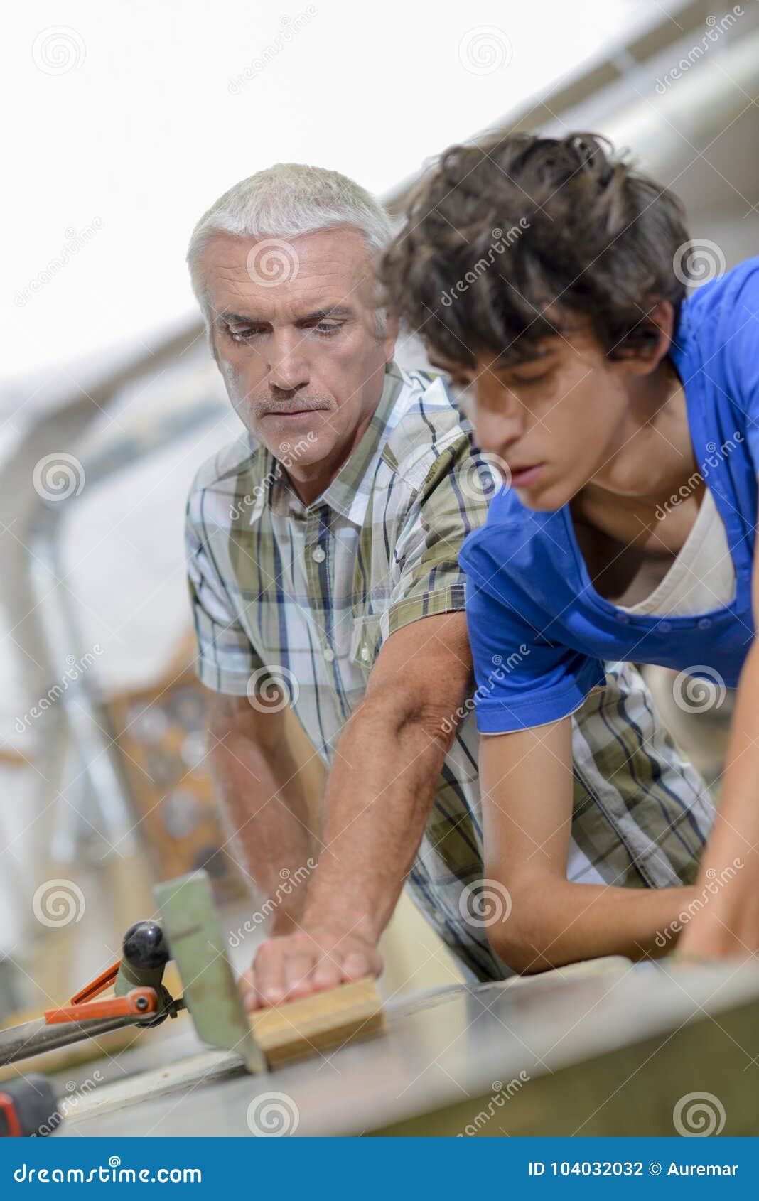 Carpenter and Son Using Table Saw Stock Photo - Image of power, manual ...