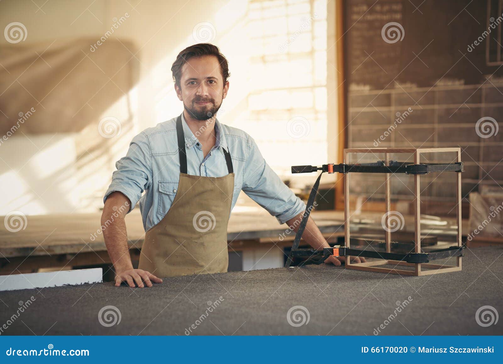 Carpenter Standing Proudly Alongside a Display Case he is Making Stock ...