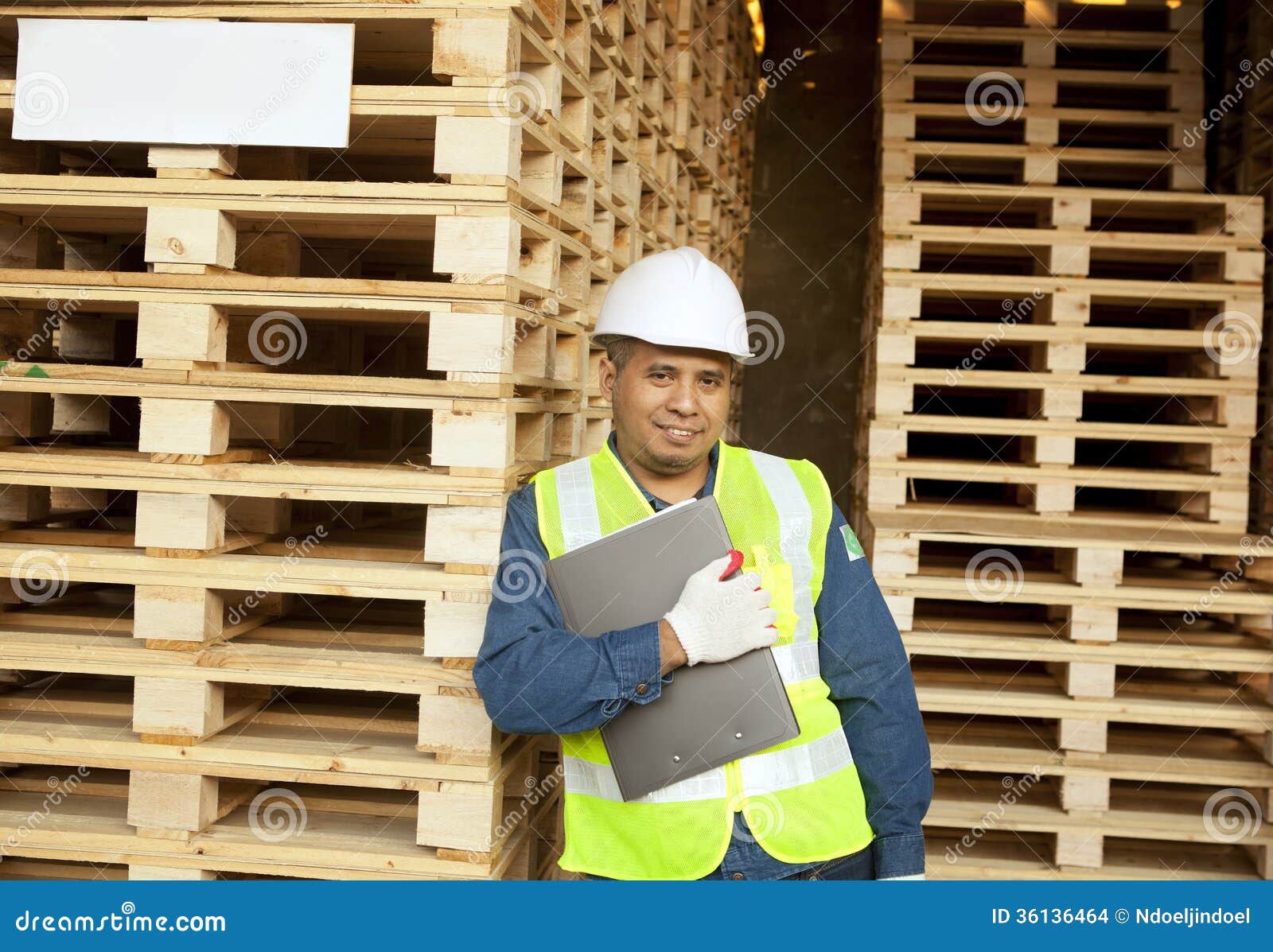 Carpenter standing stock photo. Image of hoding, factory - 36136464