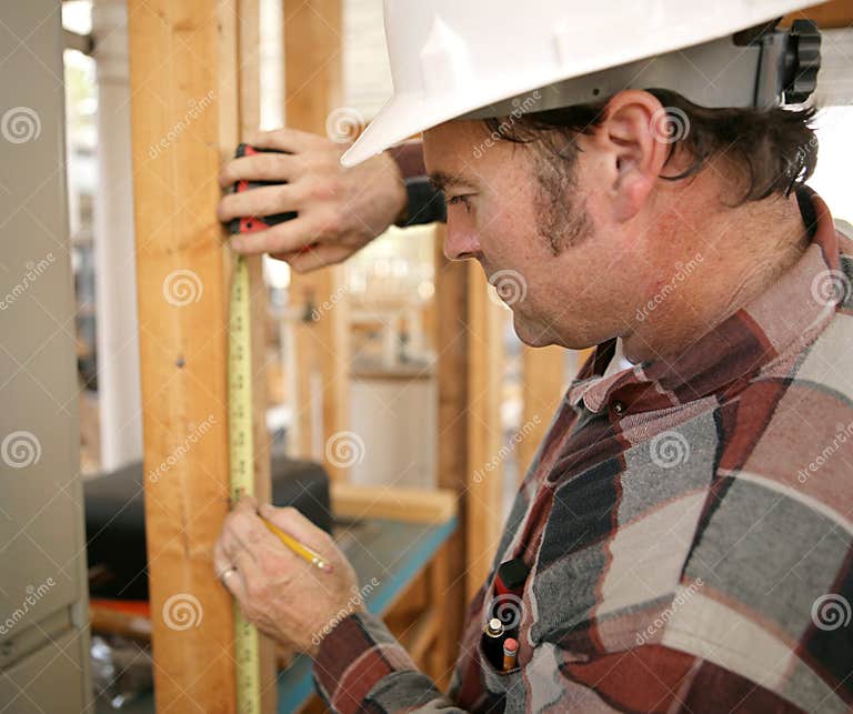 Carpenter Taking Measurements Stock Photo - Image of installing, plank ...