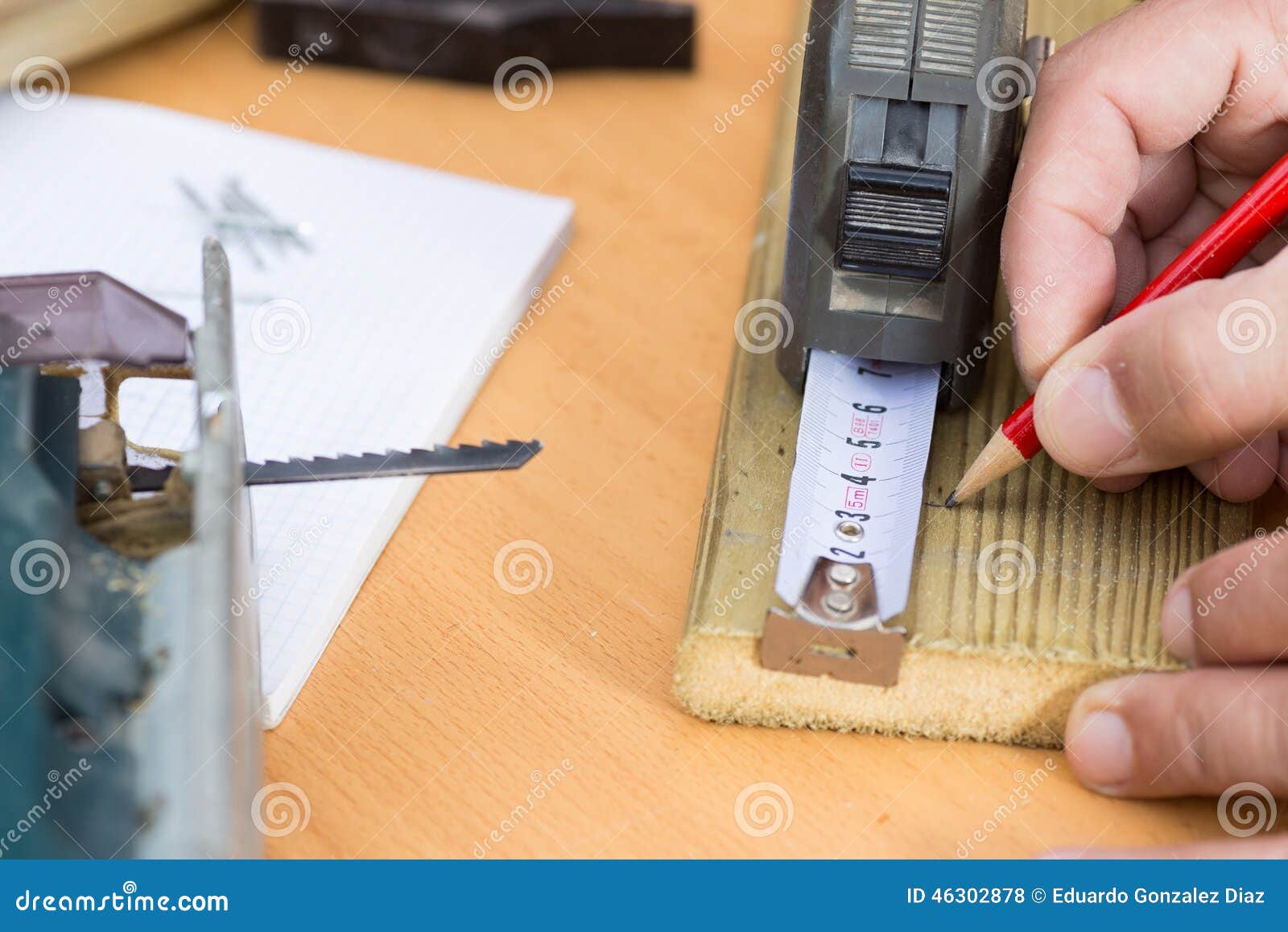 Carpenter taking steps stock photo. Image of metre, contractor - 46302878