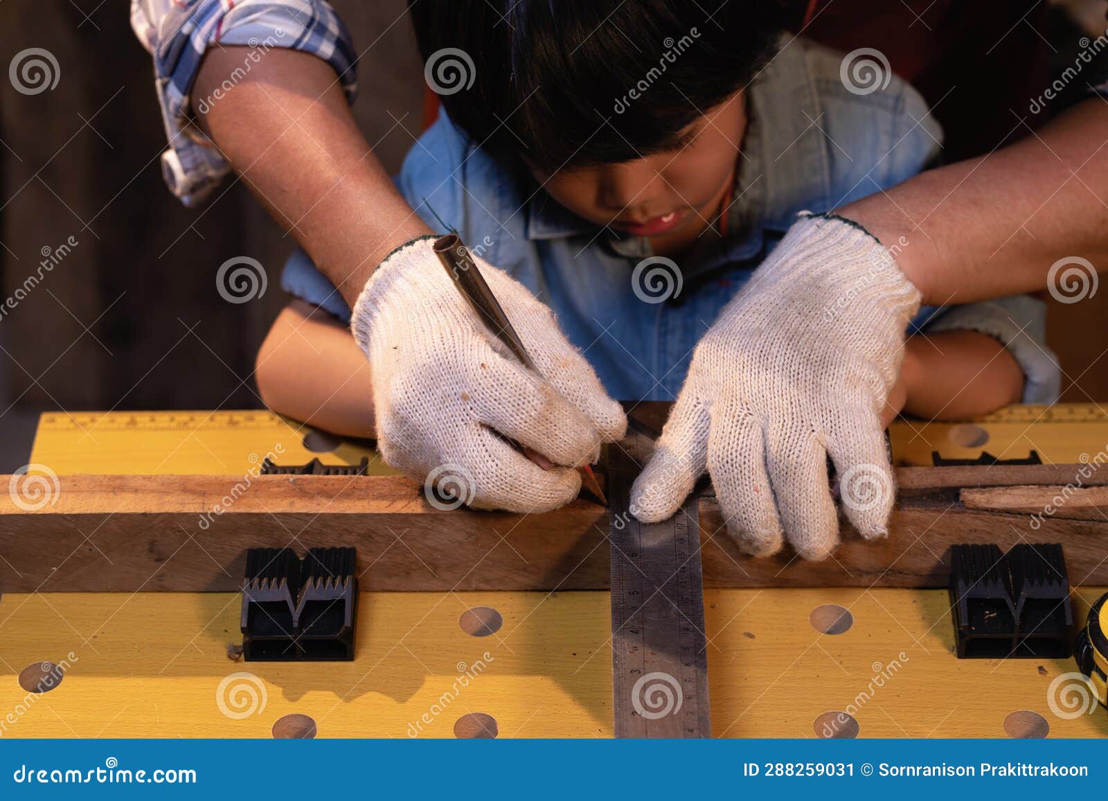 Carpenter Teaching Son To Practice Learning and Concentrated To Work ...