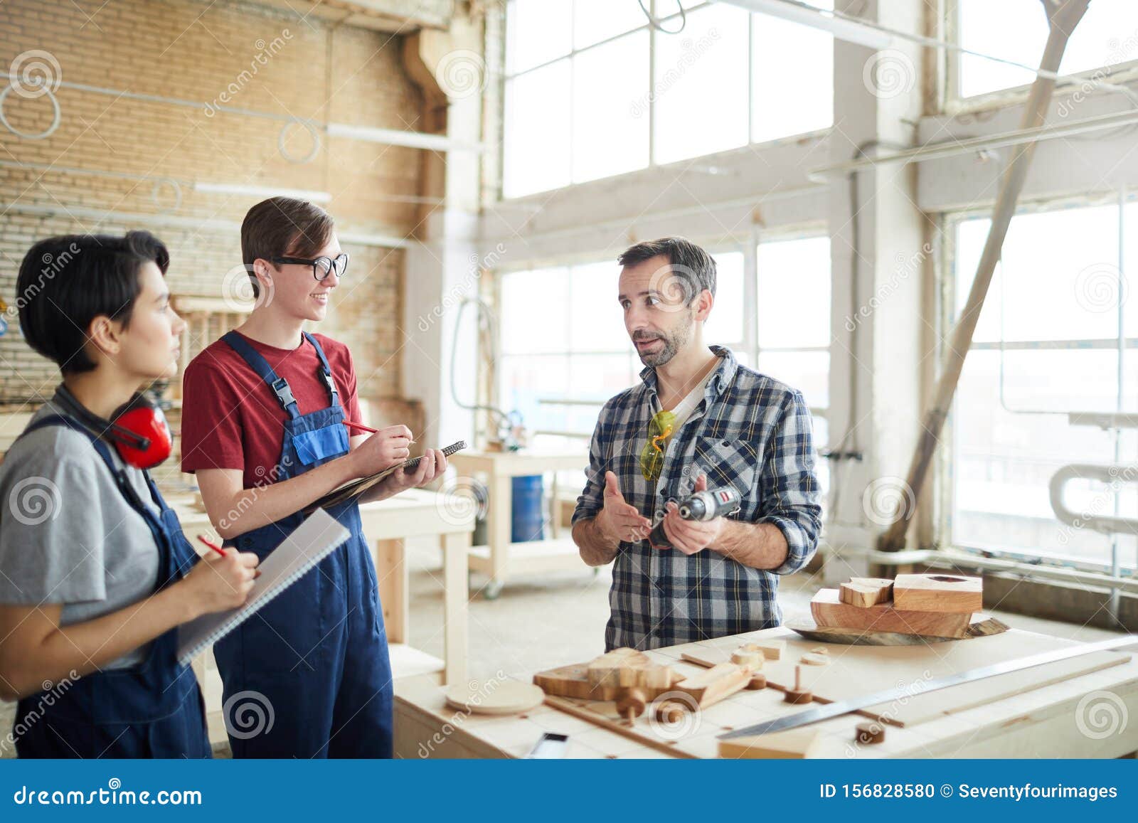 Carpenter Teaching Trainees Stock Photo - Image of factory, business ...