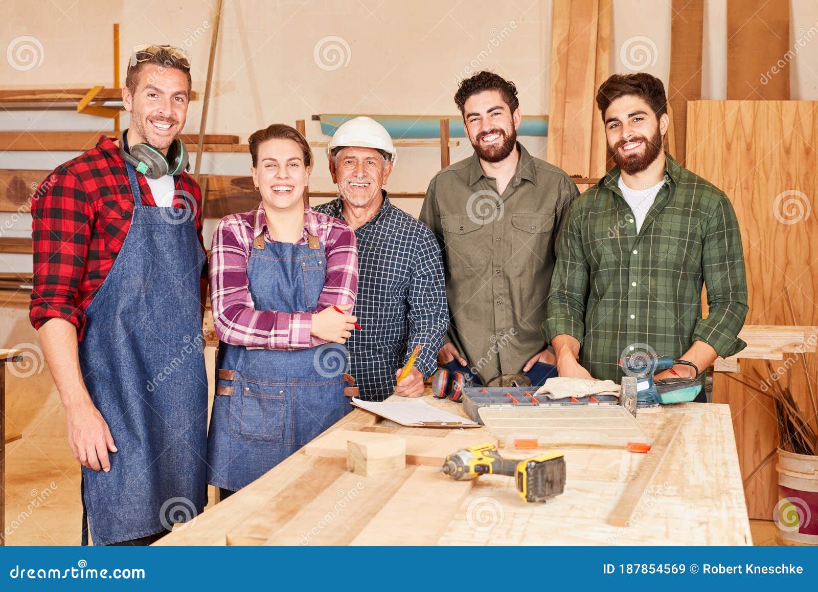 Carpenter Team with Senior and Trainees Stock Image - Image of blue ...