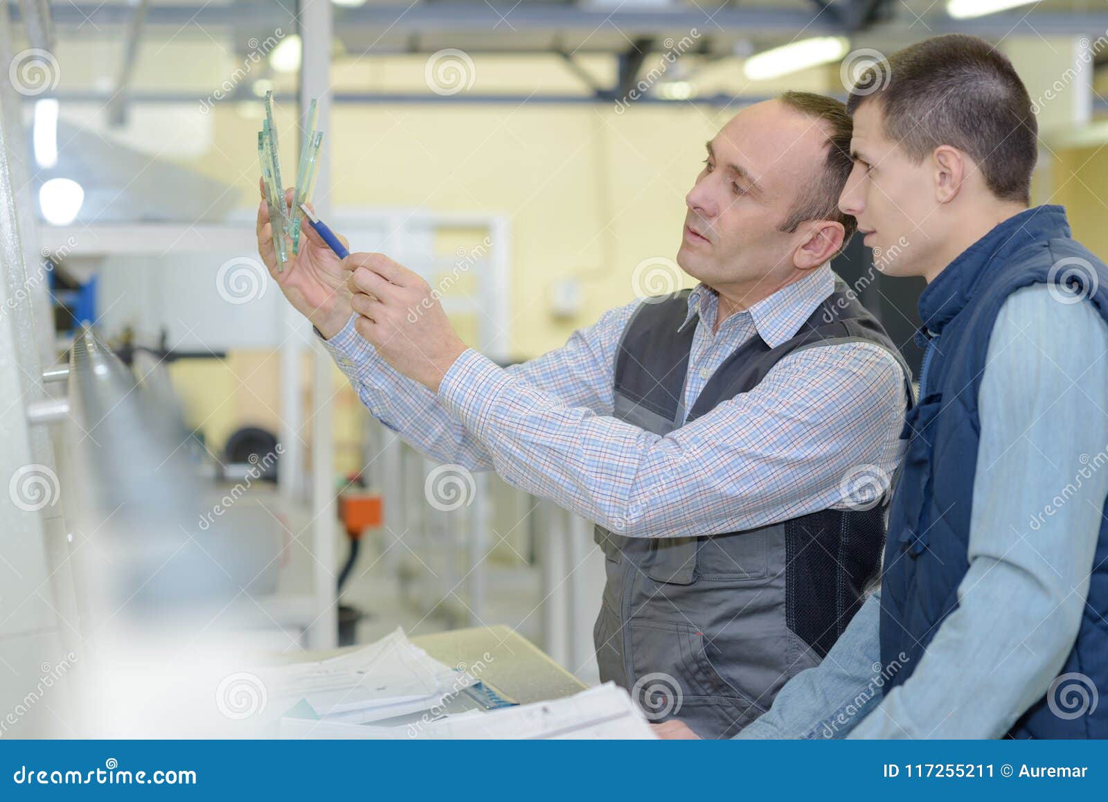 Carpenter Trainee Learning with Senior Employee Stock Image - Image of ...
