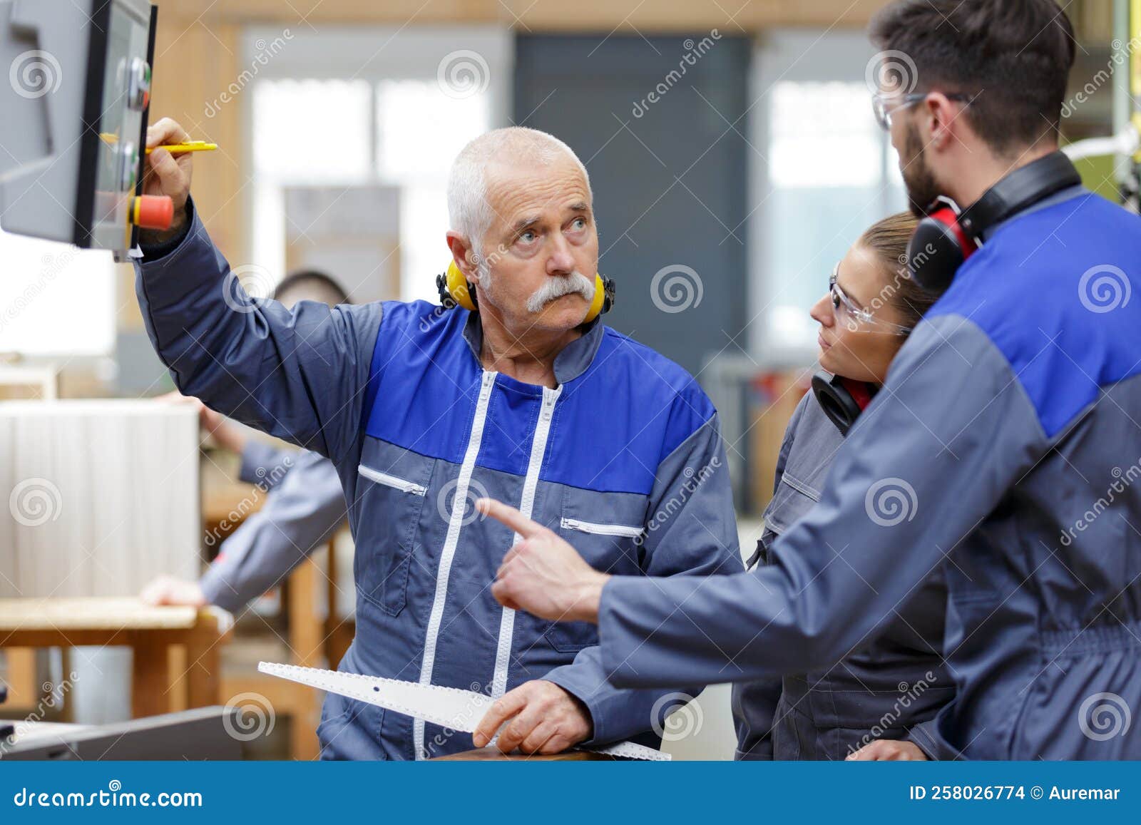 Carpenter Trainees Learning with Boss about Wood Measurement Stock ...