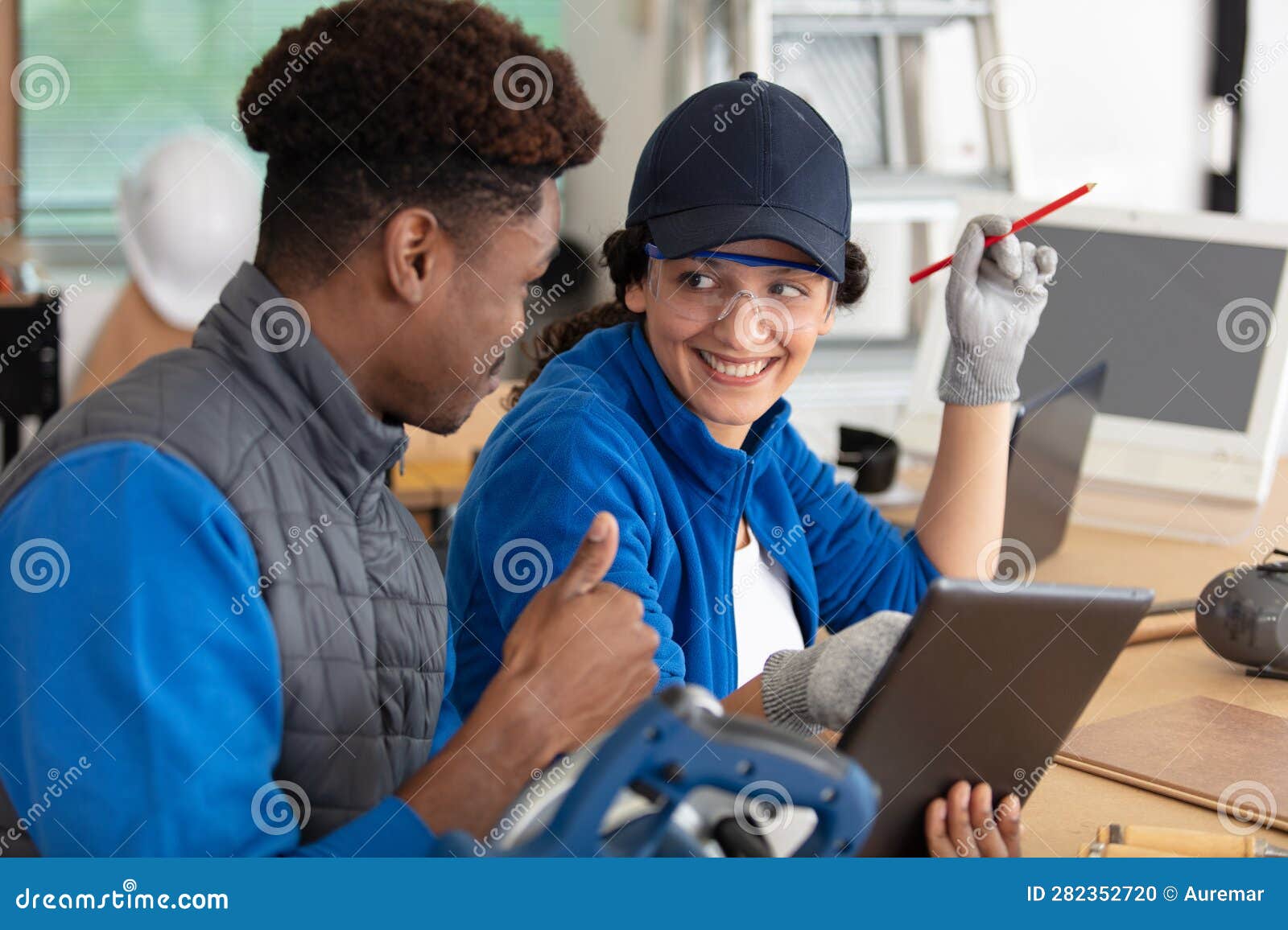 Carpenter Training Female Apprentice To Use Plane Stock Photo - Image ...