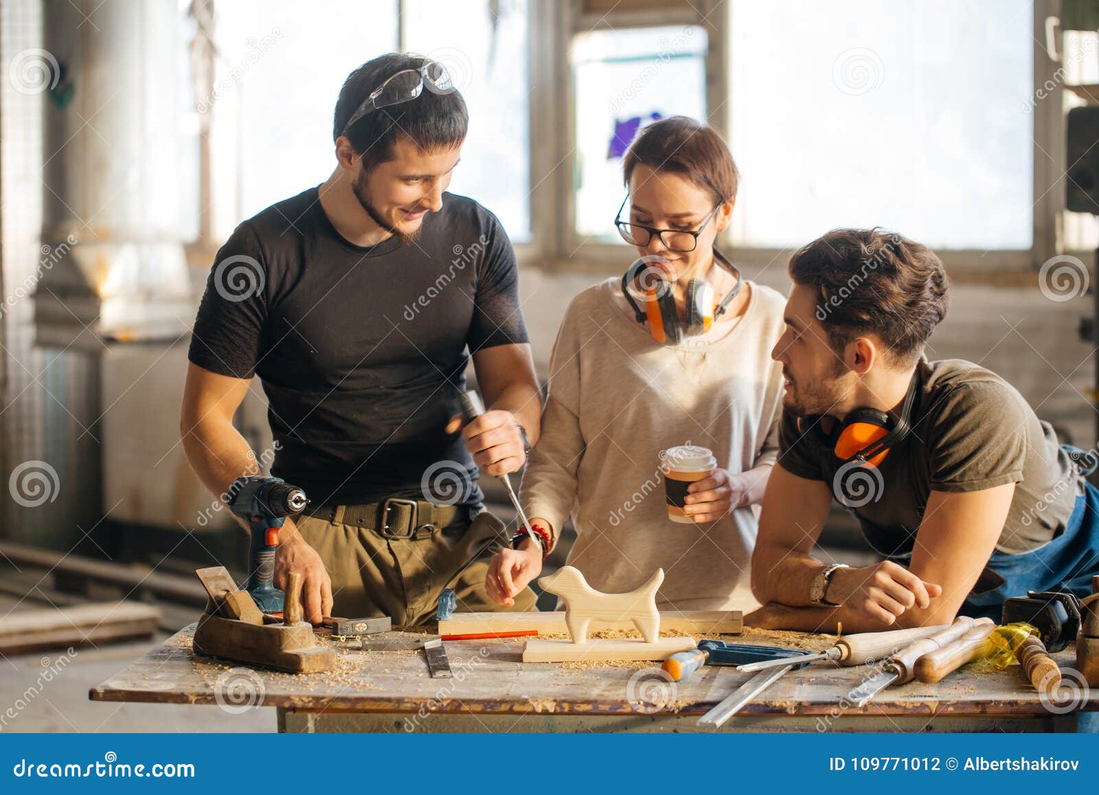Carpenter Training Female Apprentice To Use Plane Stock Photo - Image ...