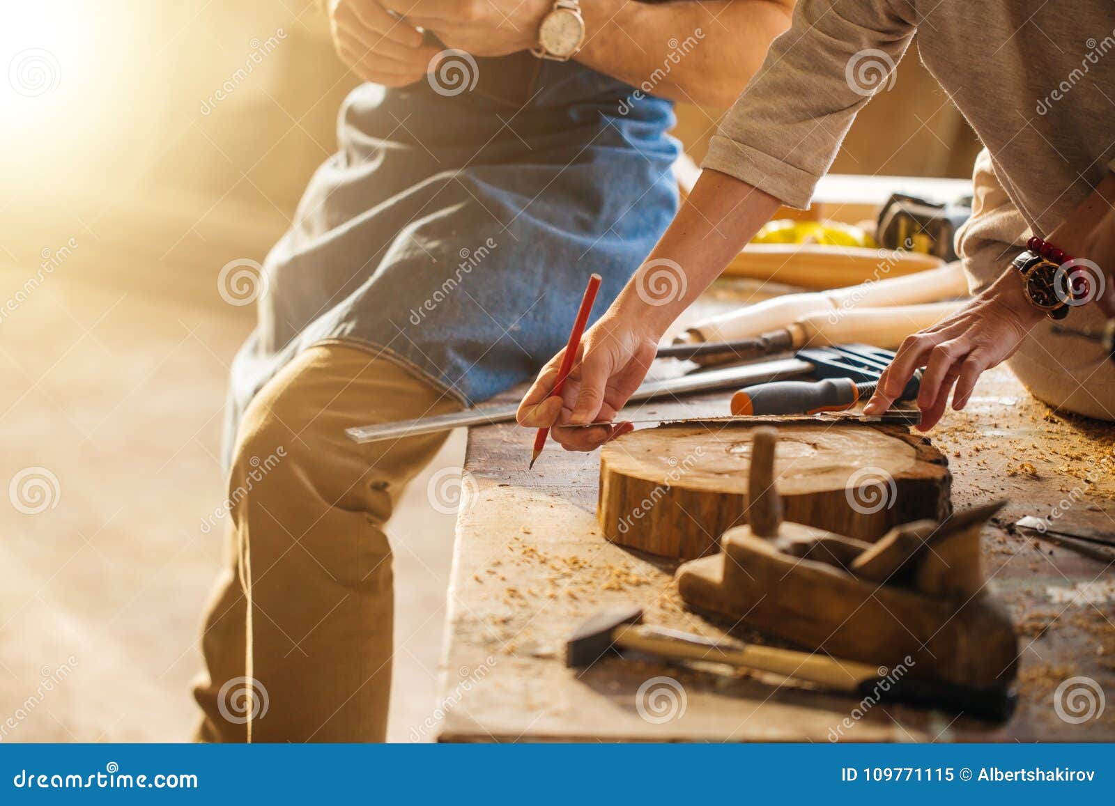 Carpenter Training Female Apprentice To Use Plane Stock Image - Image ...