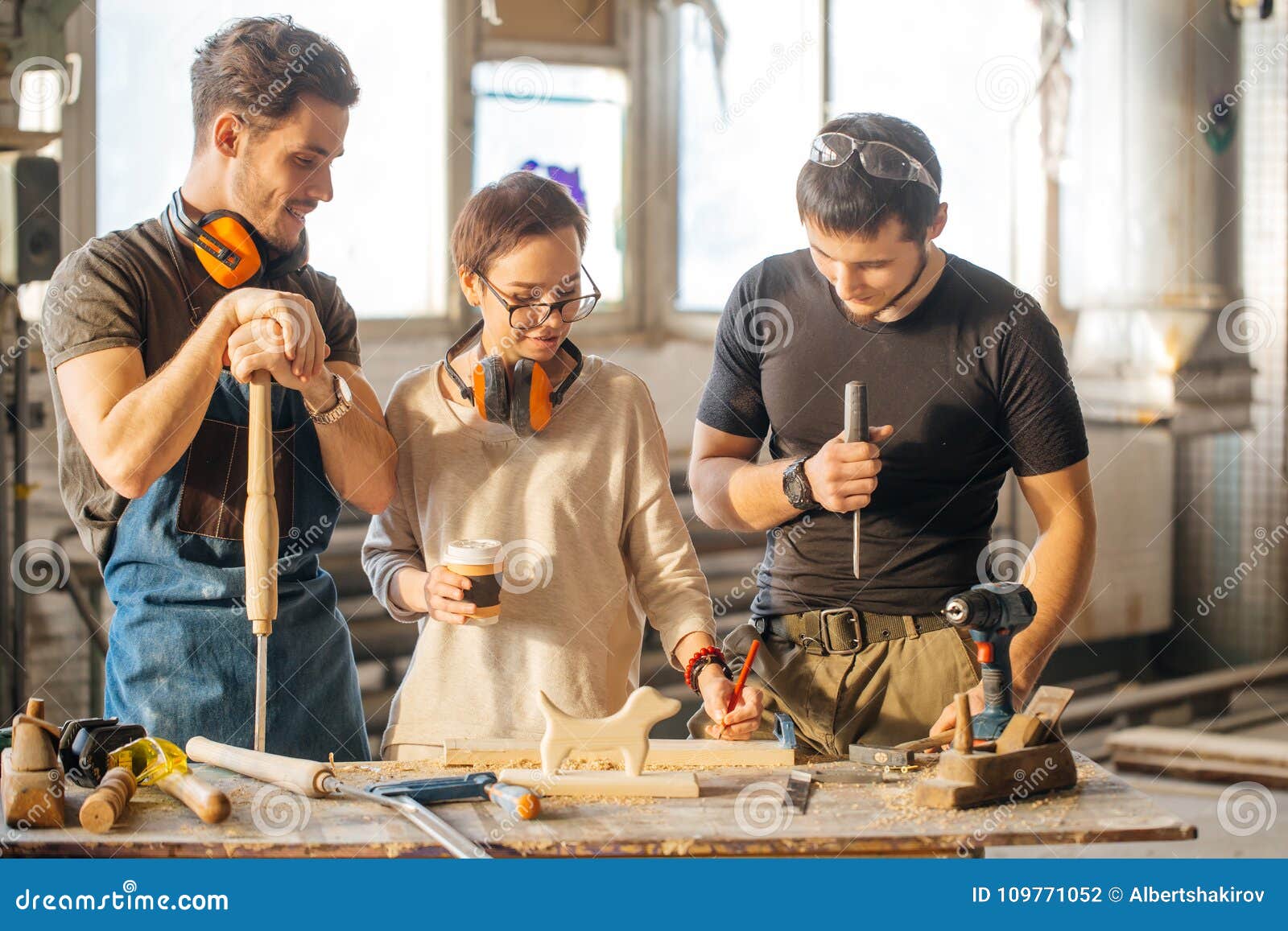 Carpenter Training Female Apprentice To Use Plane Stock Photo - Image ...