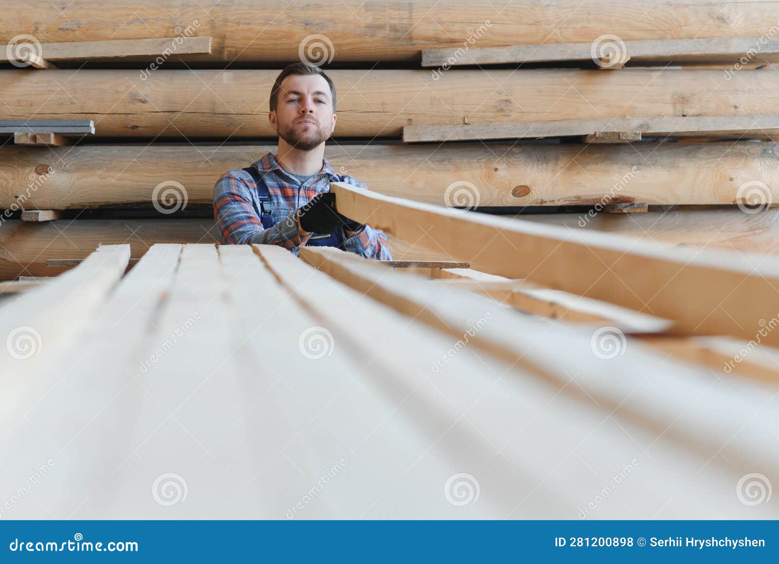 Carpenter in Uniform Check Boards on Sawmill Stock Photo - Image of ...