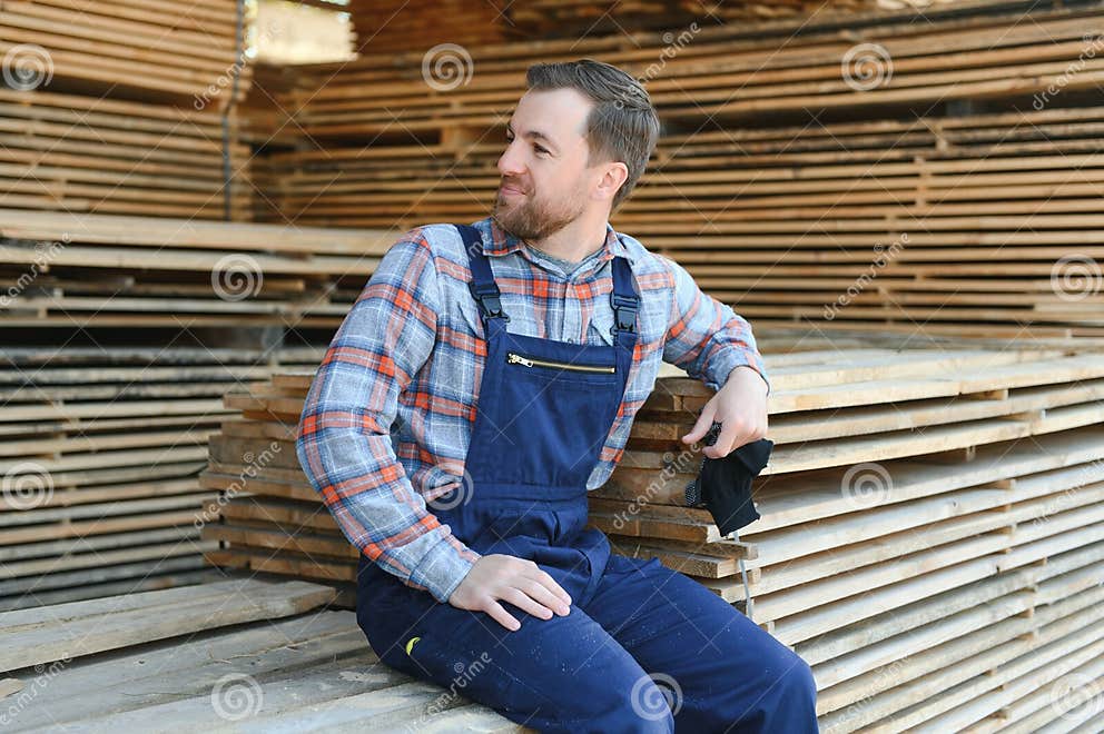 Carpenter in Uniform Check Boards on Sawmill Stock Photo - Image of ...