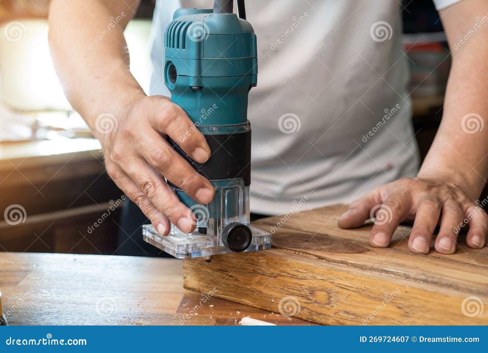 Carpenter Use Router Trimmer To Remove the Material and To Cut Out the ...