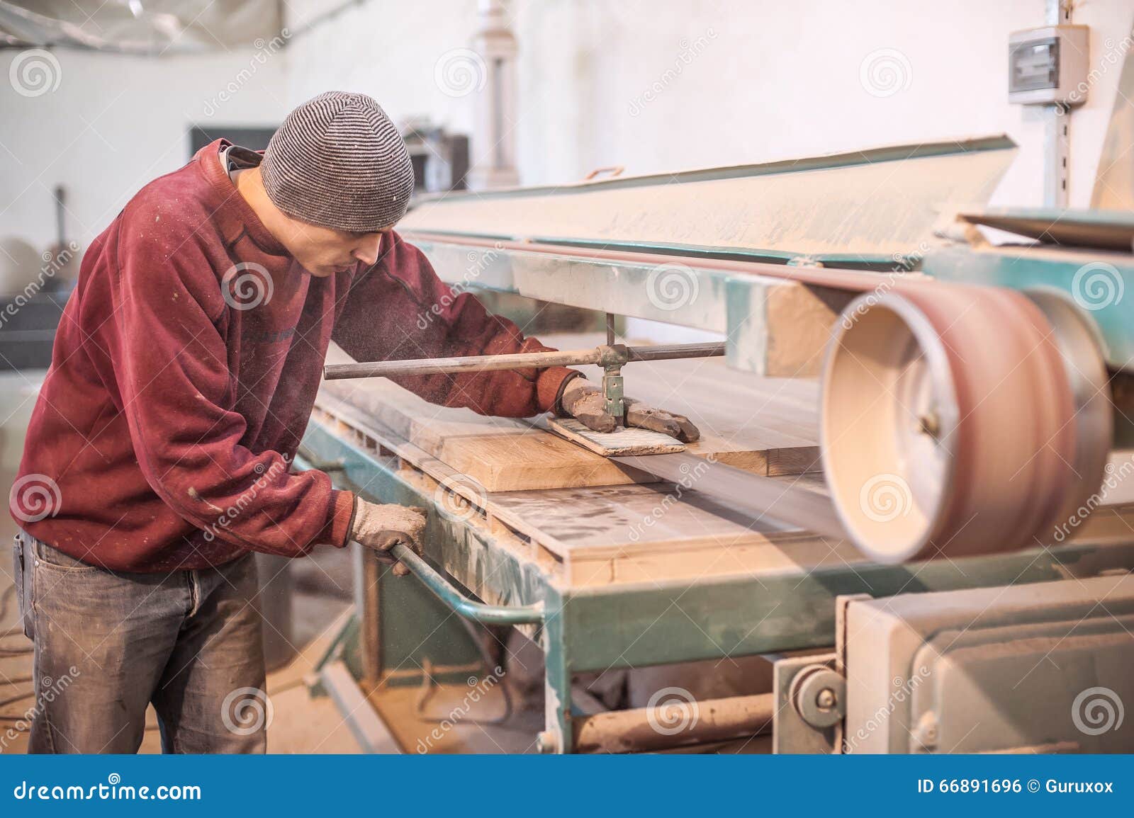 Carpenter Using Belt Sander Stock Photo | CartoonDealer.com #66891696