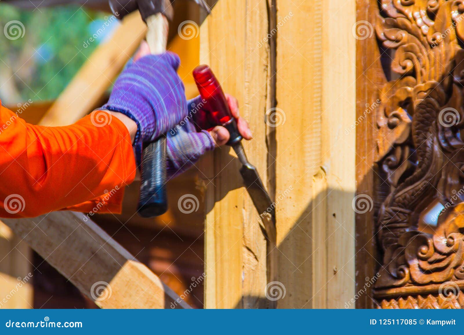 Carpenter is Using Chisel and Hammer To Groove Vertical Line. Close Up ...