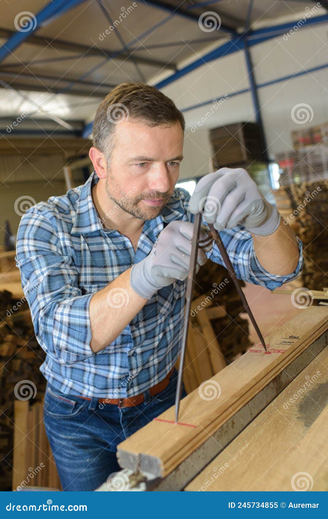 Carpenter using compass stock image. Image of tools - 245734855