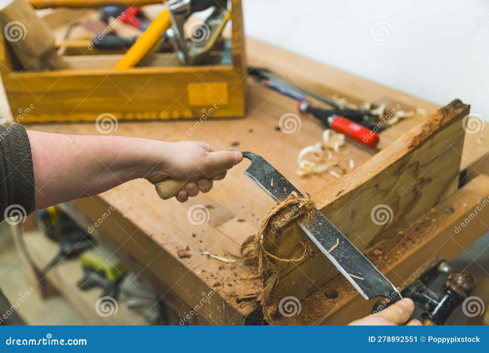 Carpenter Using Draw Shave Tool To Smooth Out the Wood in a Carpenter ...