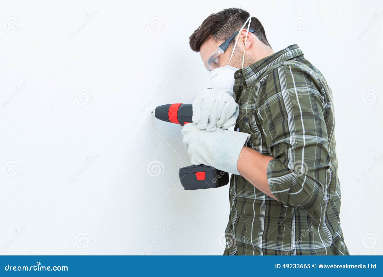 Carpenter Using Drill Machine on White Wall Stock Image - Image of ...