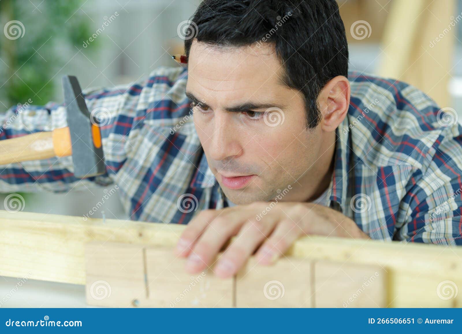 Carpenter using hammer stock image. Image of design - 266506651