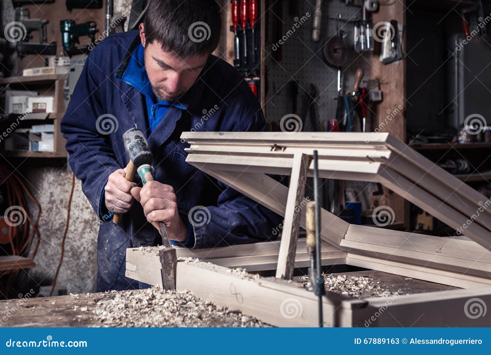 Carpenter Using Hammer and Chisel in Workshop Stock Image - Image of ...