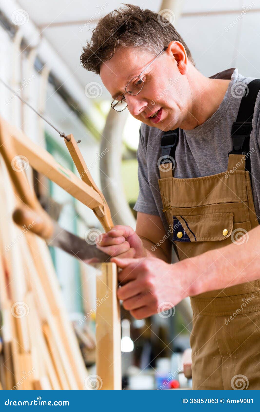 Carpenter using hand saw stock image. Image of carpentry - 36857063