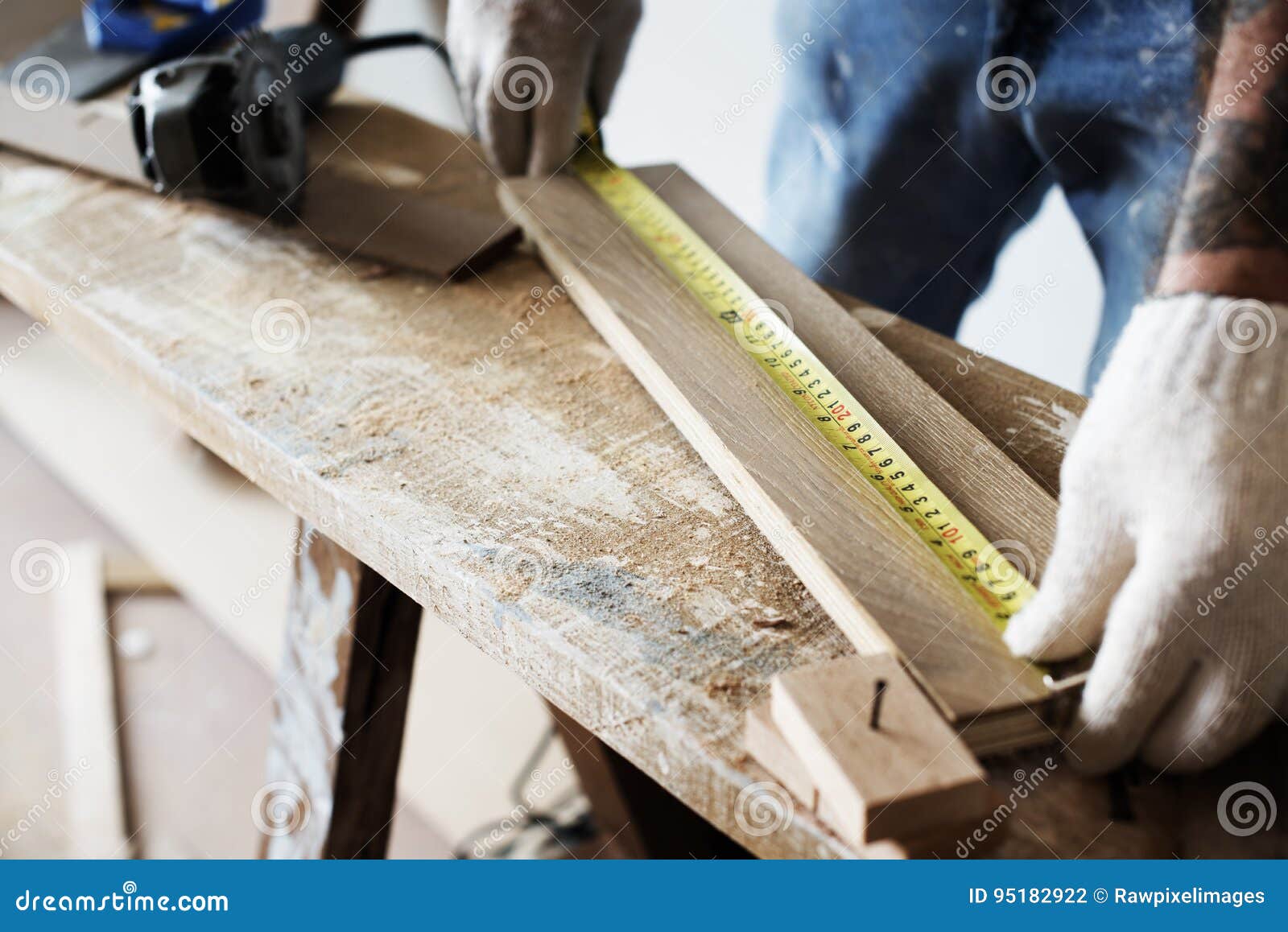 Carpenter Using Pencil and Measurement Tape on Wood Stock Photo - Image ...