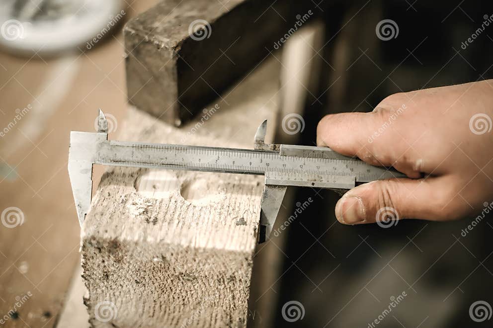 Carpenter Using Ruler for His Job in Carpentry Workshop Stock Photo ...