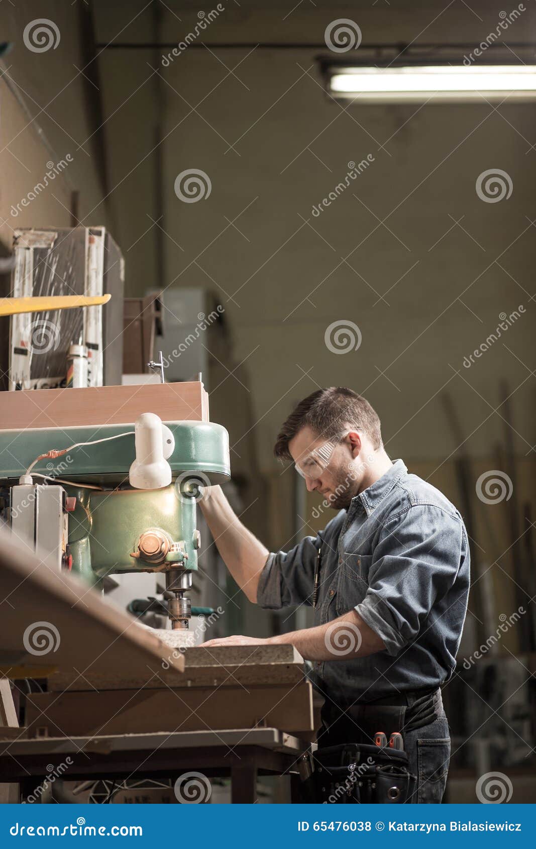 Carpenter Using Woodworking Machine Stock Photo - Image of equipment ...