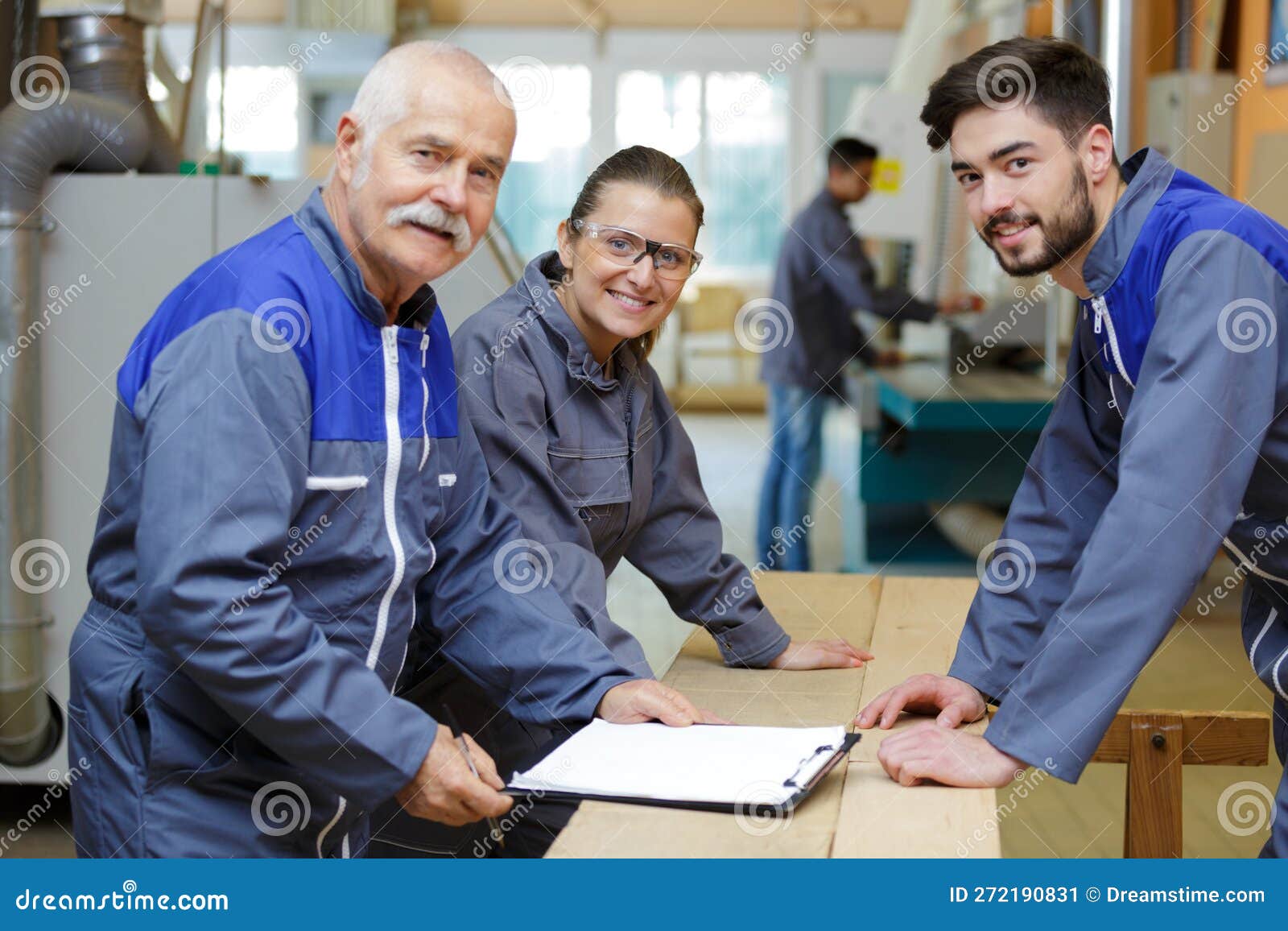 Carpenter with Woman and Man Apprentice in Workshop Stock Image - Image ...