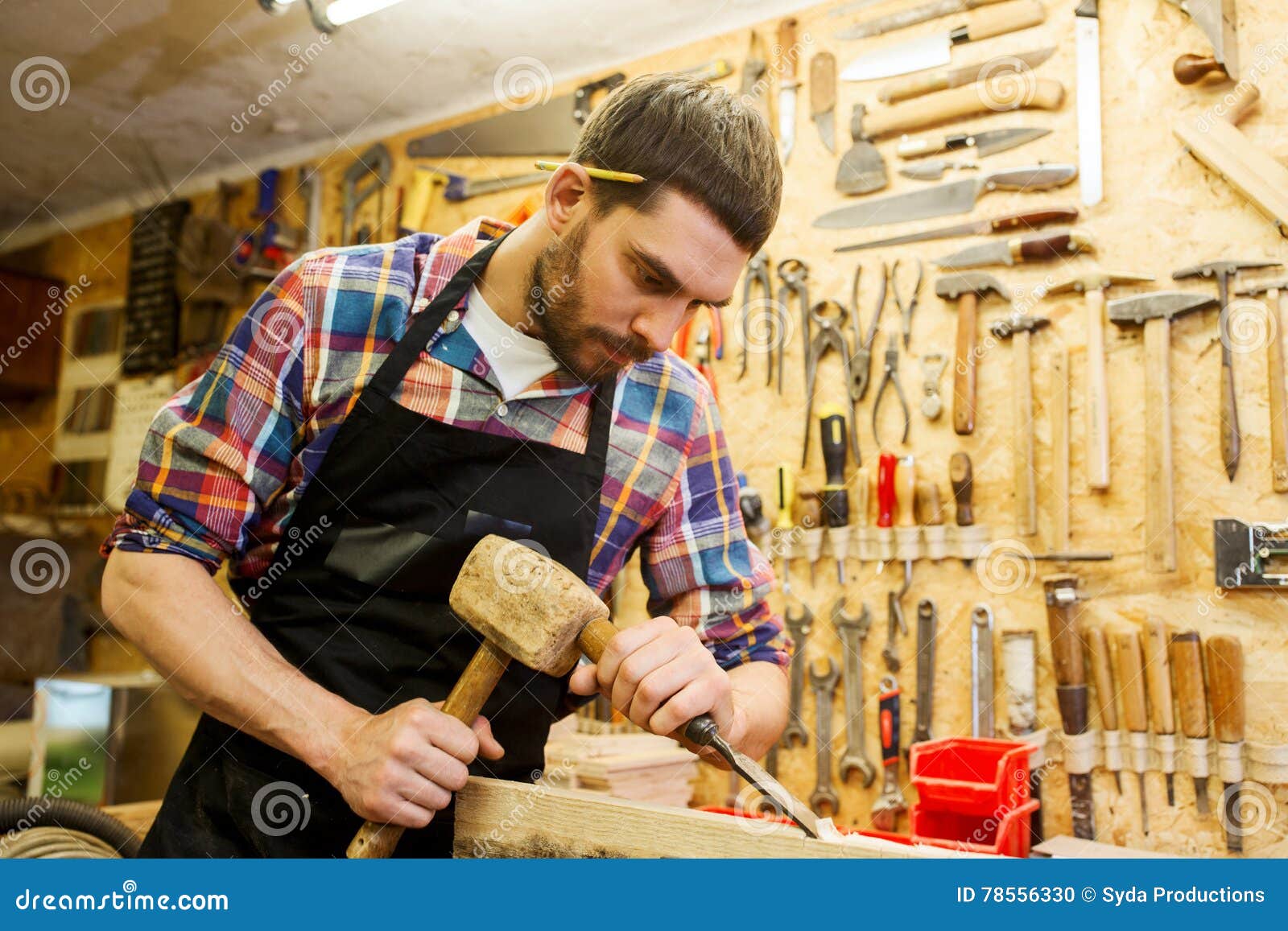 Carpenter with Wood, Hammer and Chisel at Workshop Stock Photo - Image ...