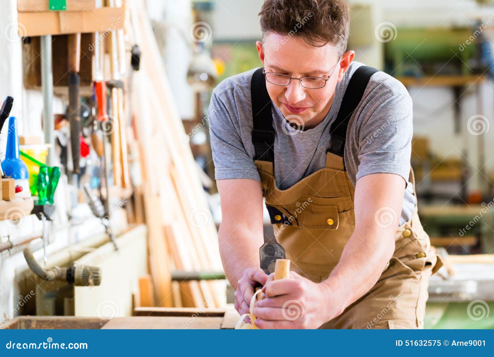 Carpenter with Wood Planer and Workpiece in Carpentry Stock Image ...