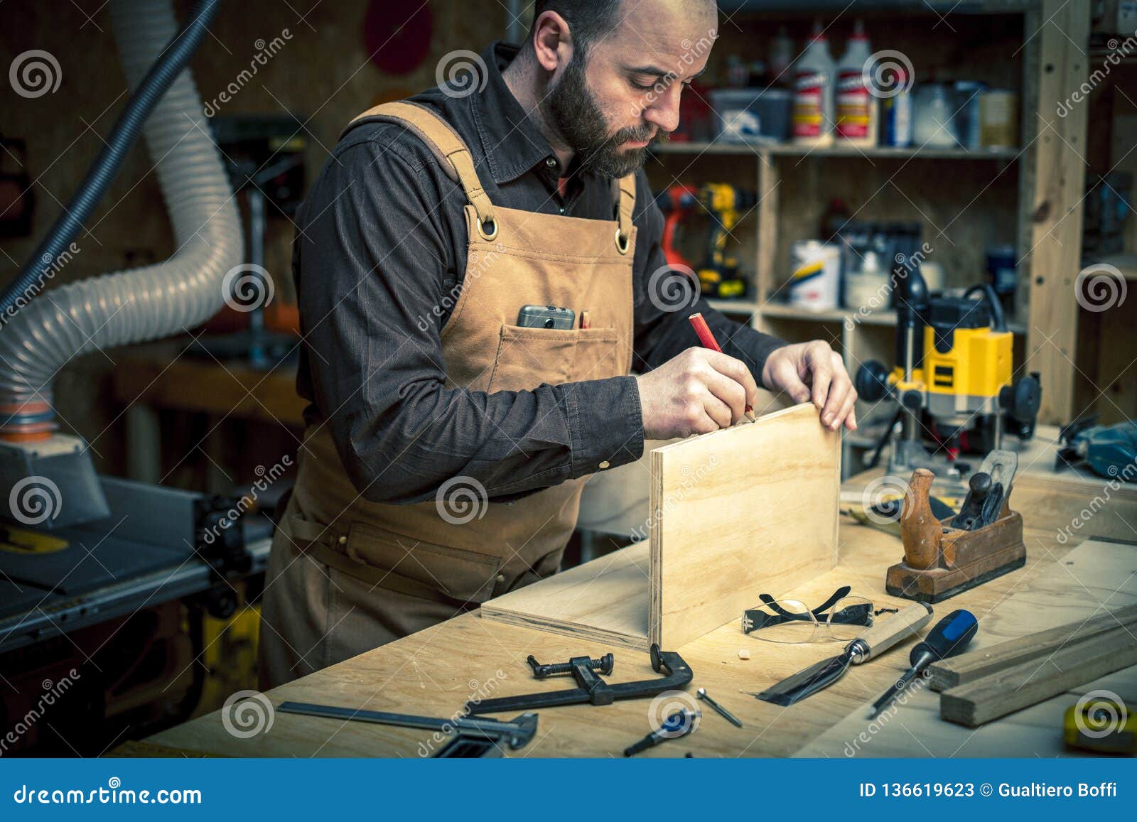 Carpenter at work stock image. Image of occupation, protection - 136619623