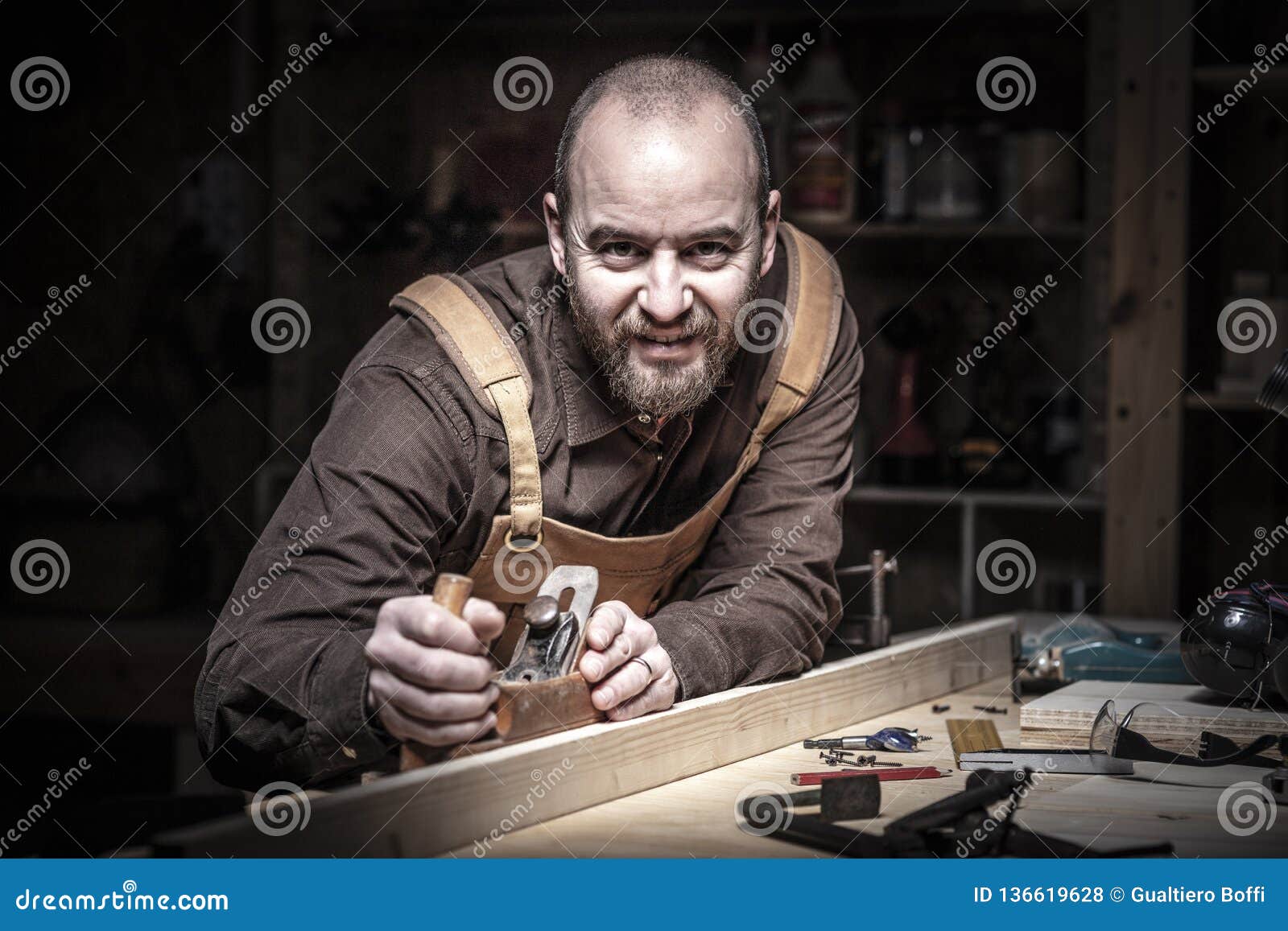 Carpenter at work stock photo. Image of equipment, manual - 136619628