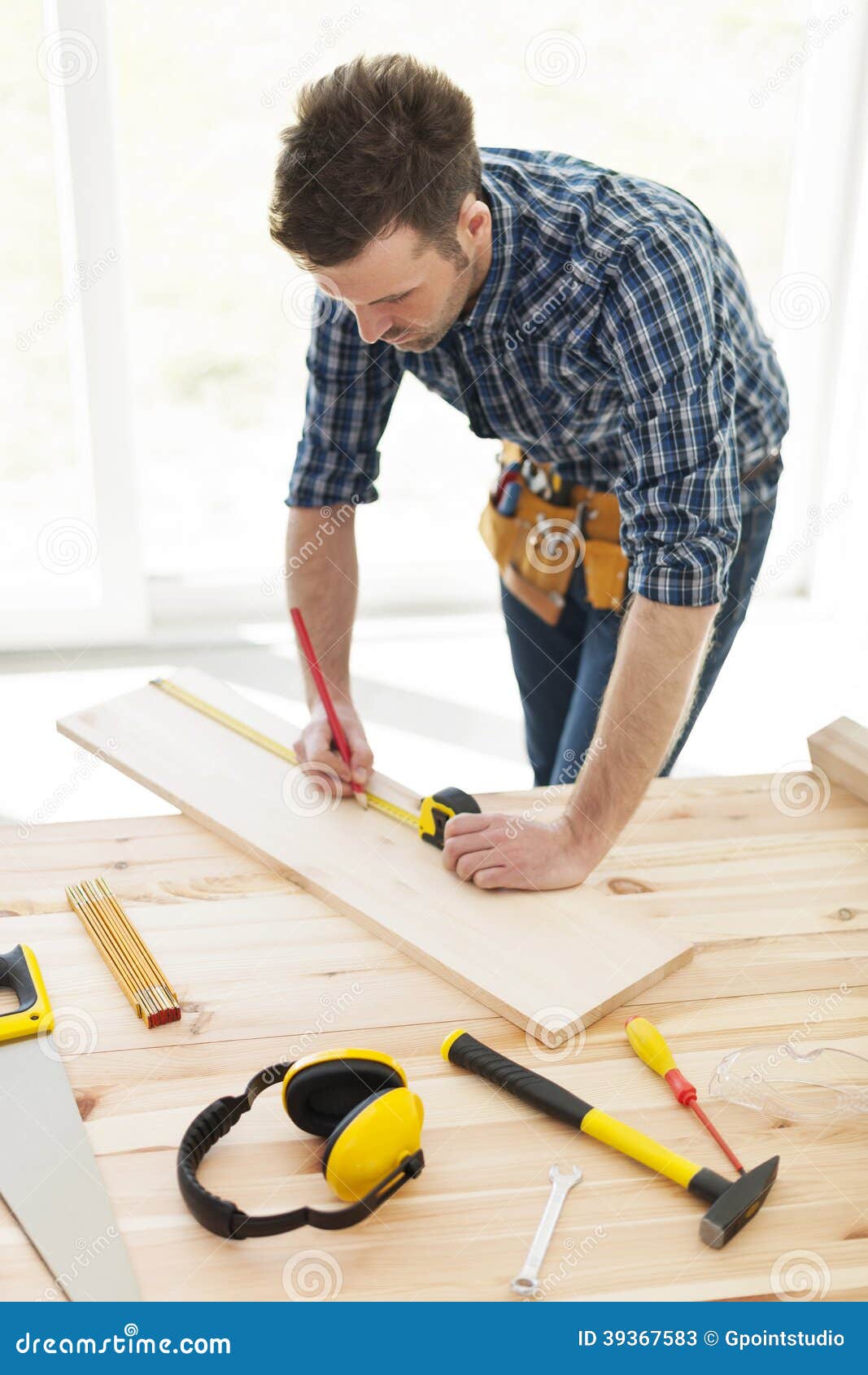 Carpenter at work stock image. Image of building, improvement - 39367583