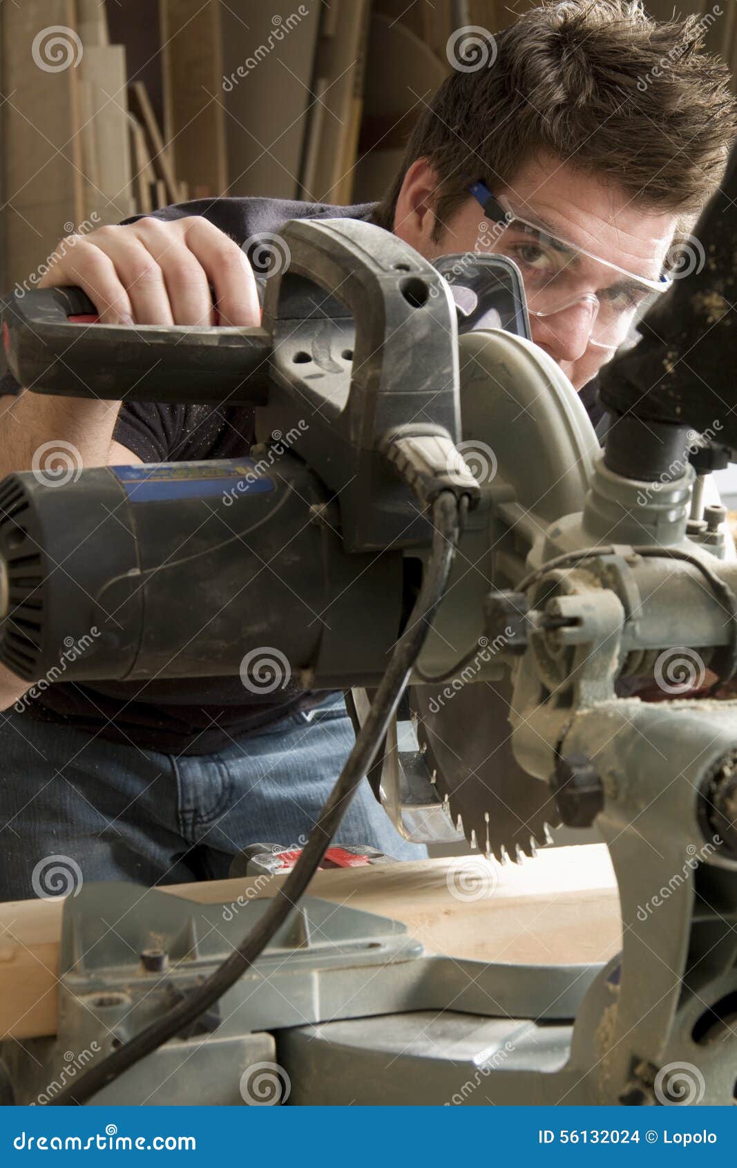 Carpenter at Work on Job Using Power Tool Stock Photo - Image of action ...