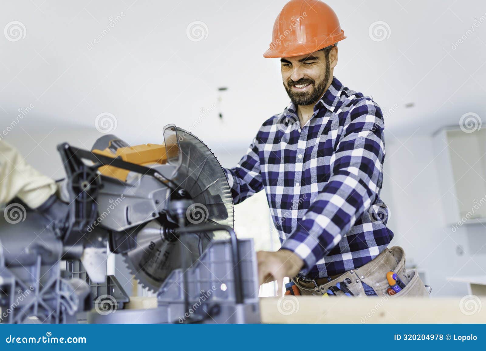 Carpenter at Work on Job Using Power Tool Stock Photo - Image of ...