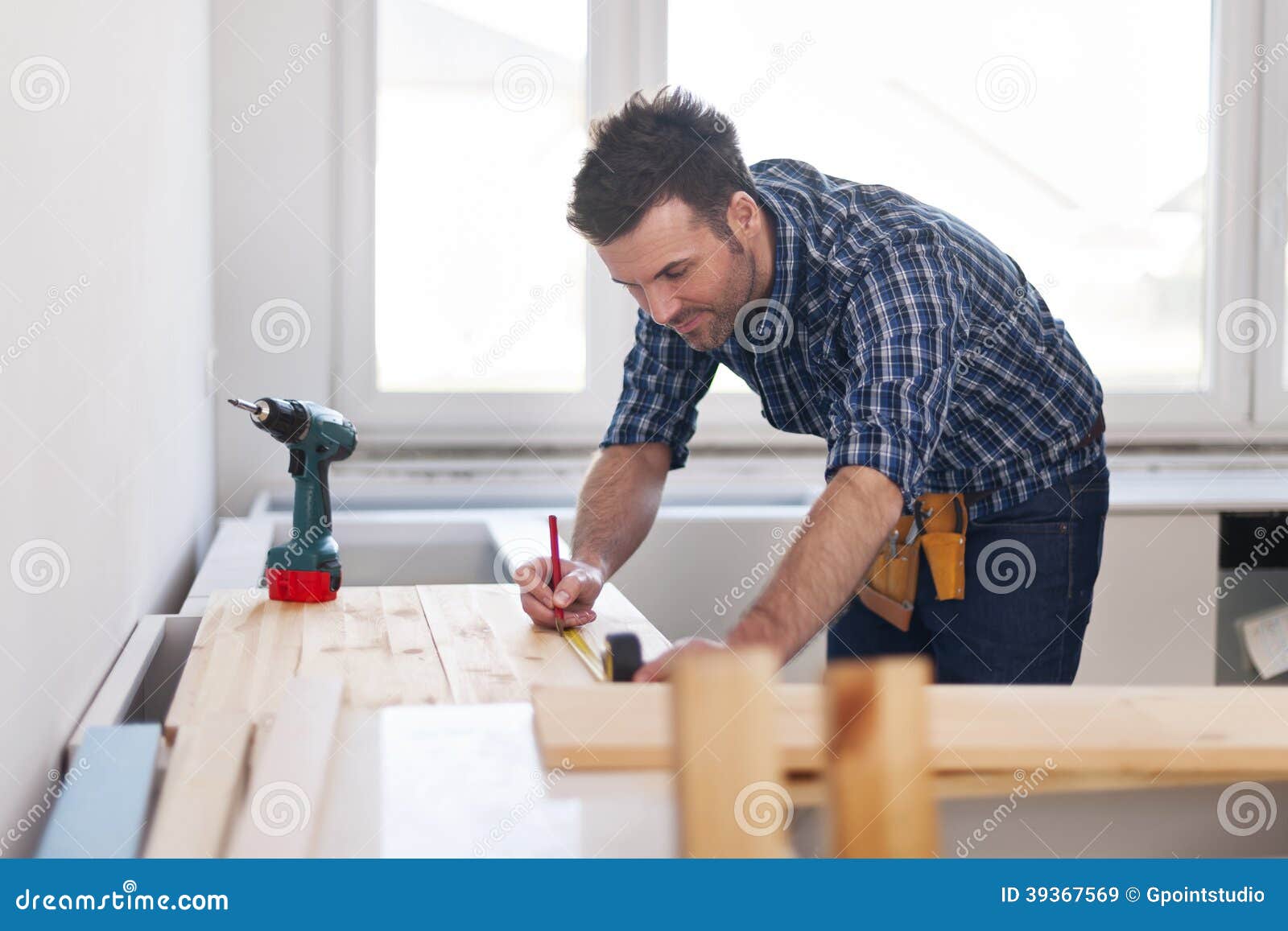 Carpenter at work stock image. Image of plank, male, improvement - 39367569