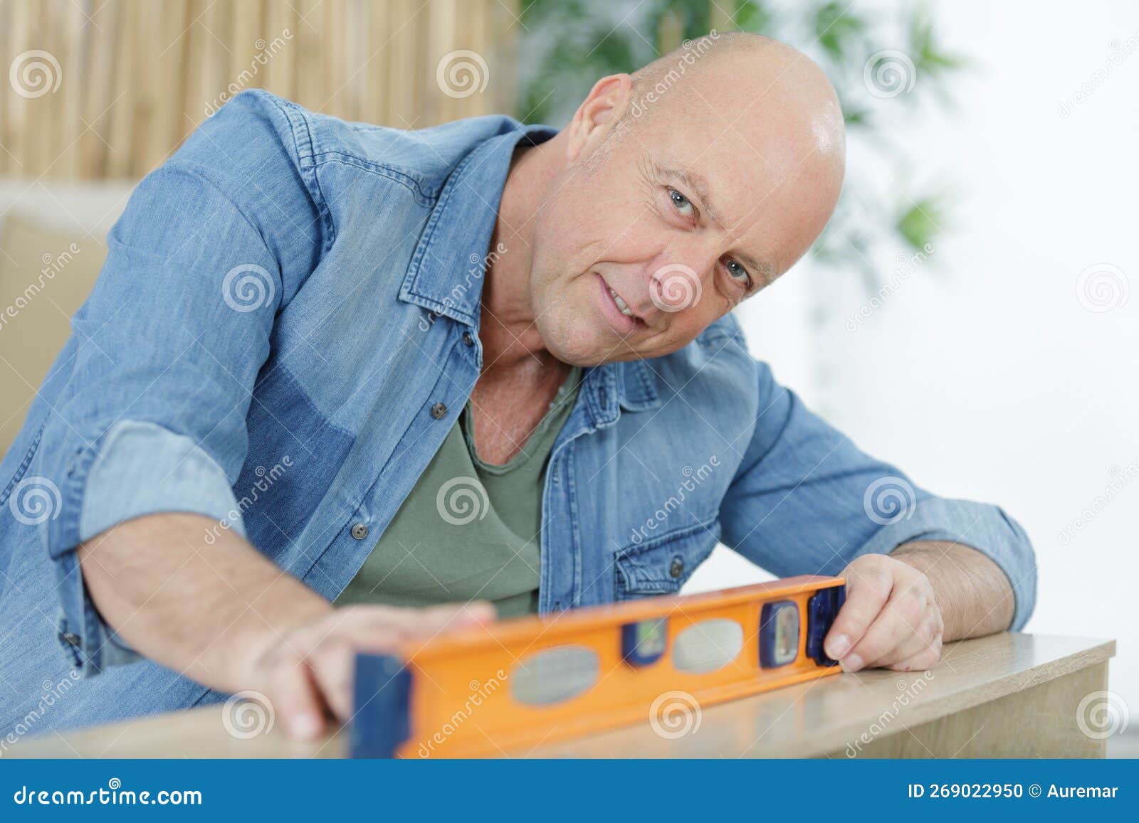 Carpenter at Work with Spirit Level on Wood Stock Photo - Image of ...