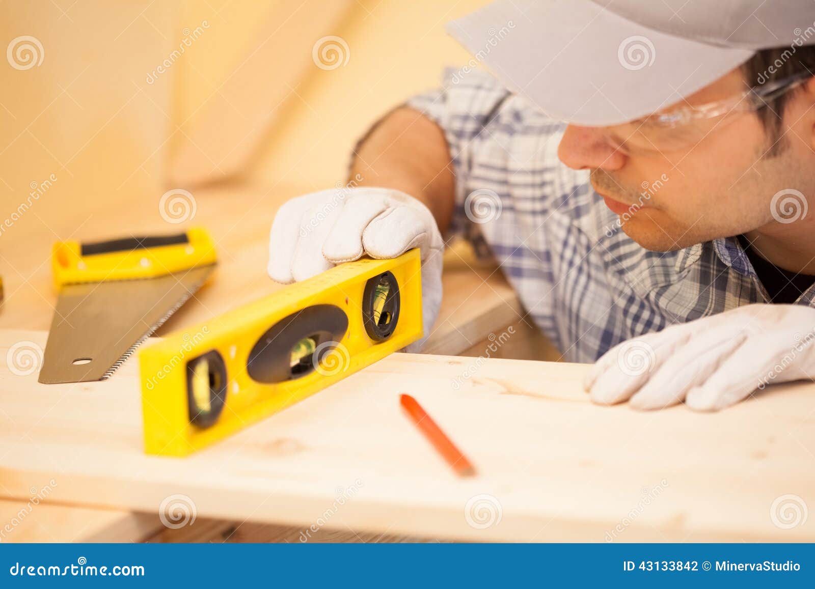 Carpenter at Work Using a Bubble Level Stock Photo - Image of wood ...