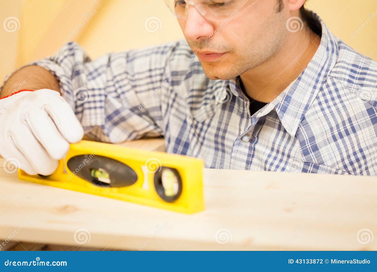 Carpenter at Work Using a Bubble Level Stock Photo - Image of repair ...