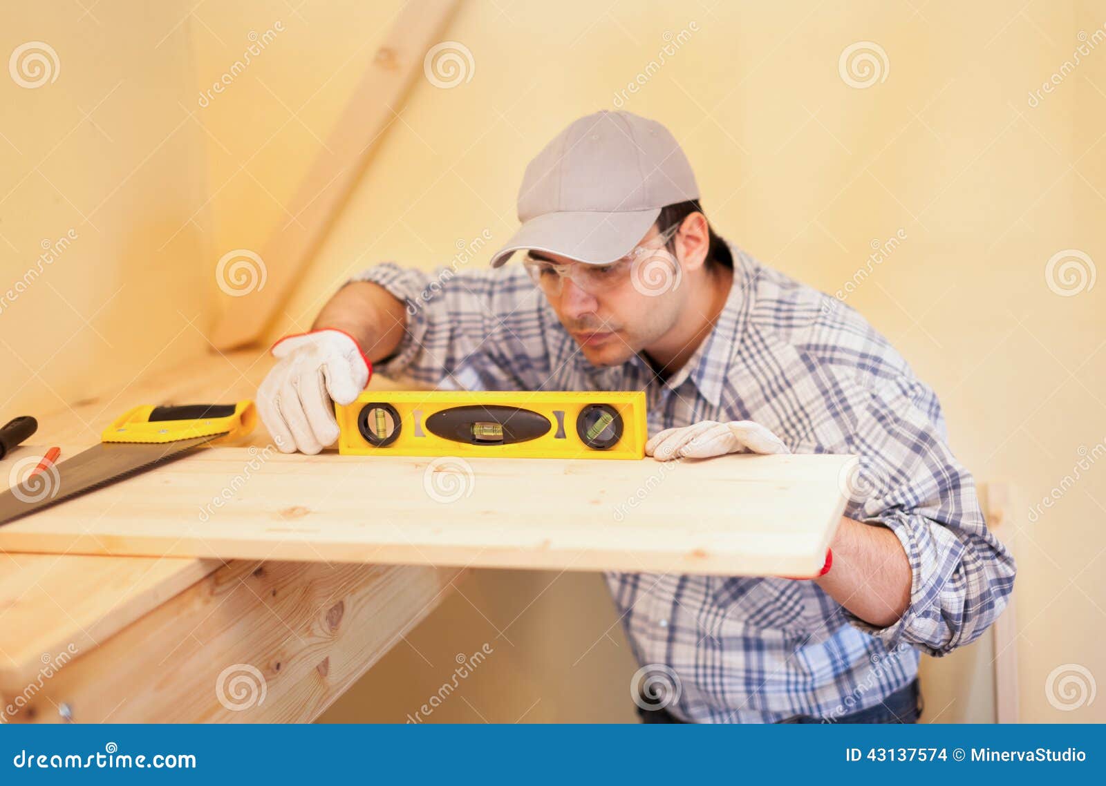 Carpenter at Work Using a Bubble Level Stock Photo - Image of ...