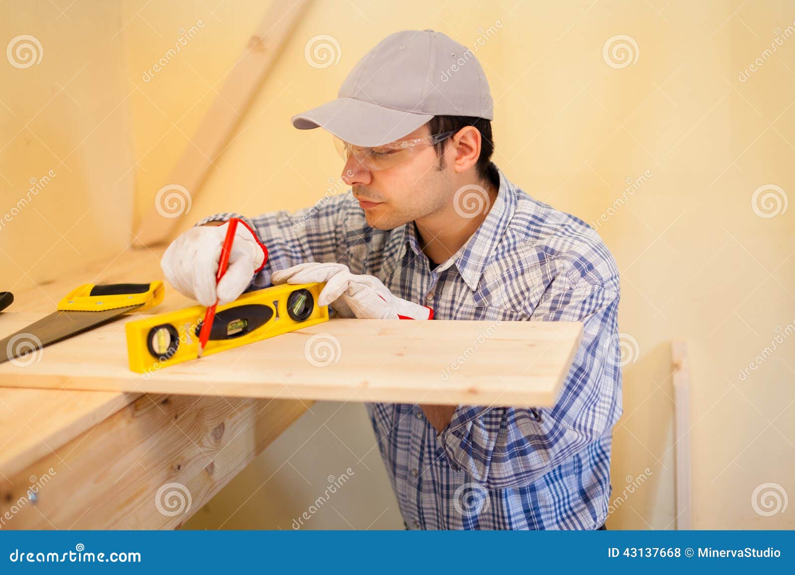 Carpenter at Work Using a Bubble Level Stock Photo - Image of manual ...