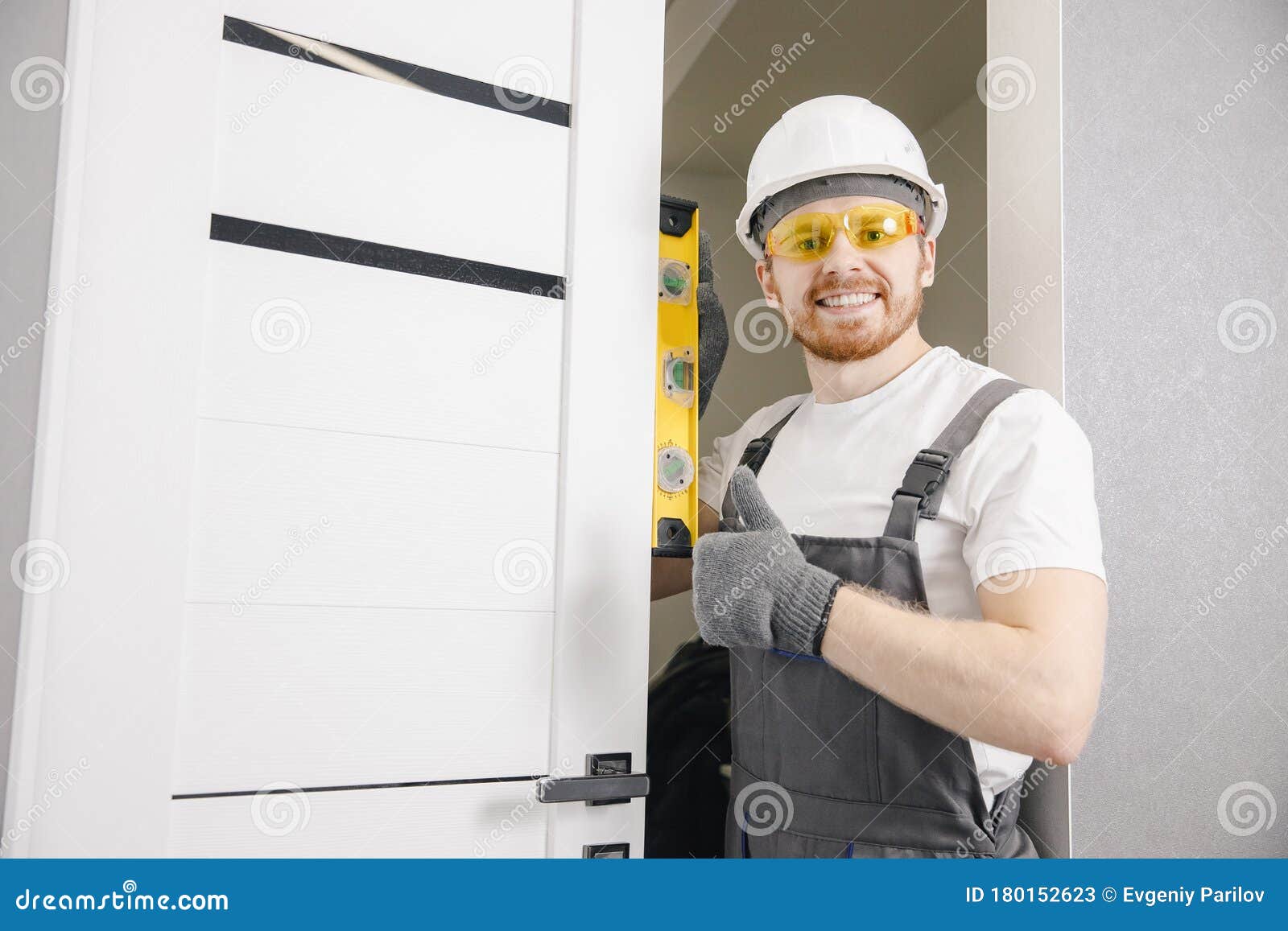 Carpenter Worker Installation Process of Wood Door Hinge Tool Level ...