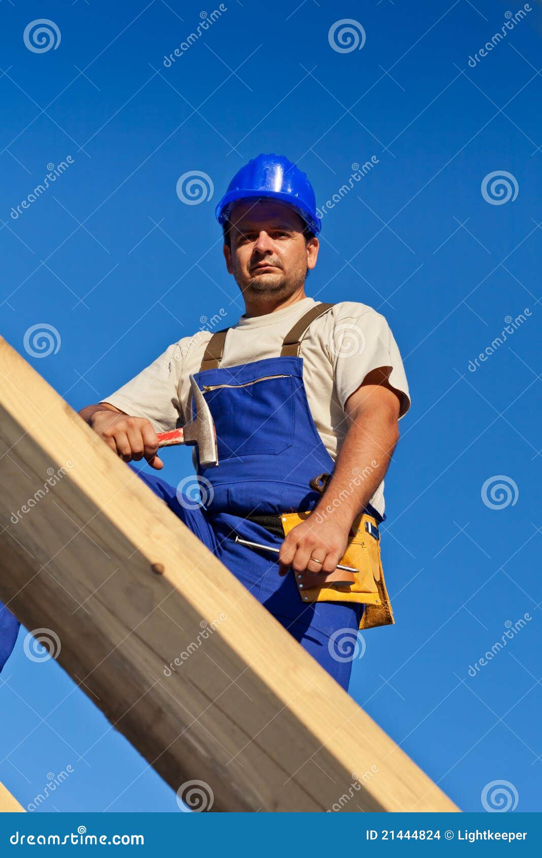 Carpenter Worker on Top of Roof Stock Photo - Image of bright, handsome ...