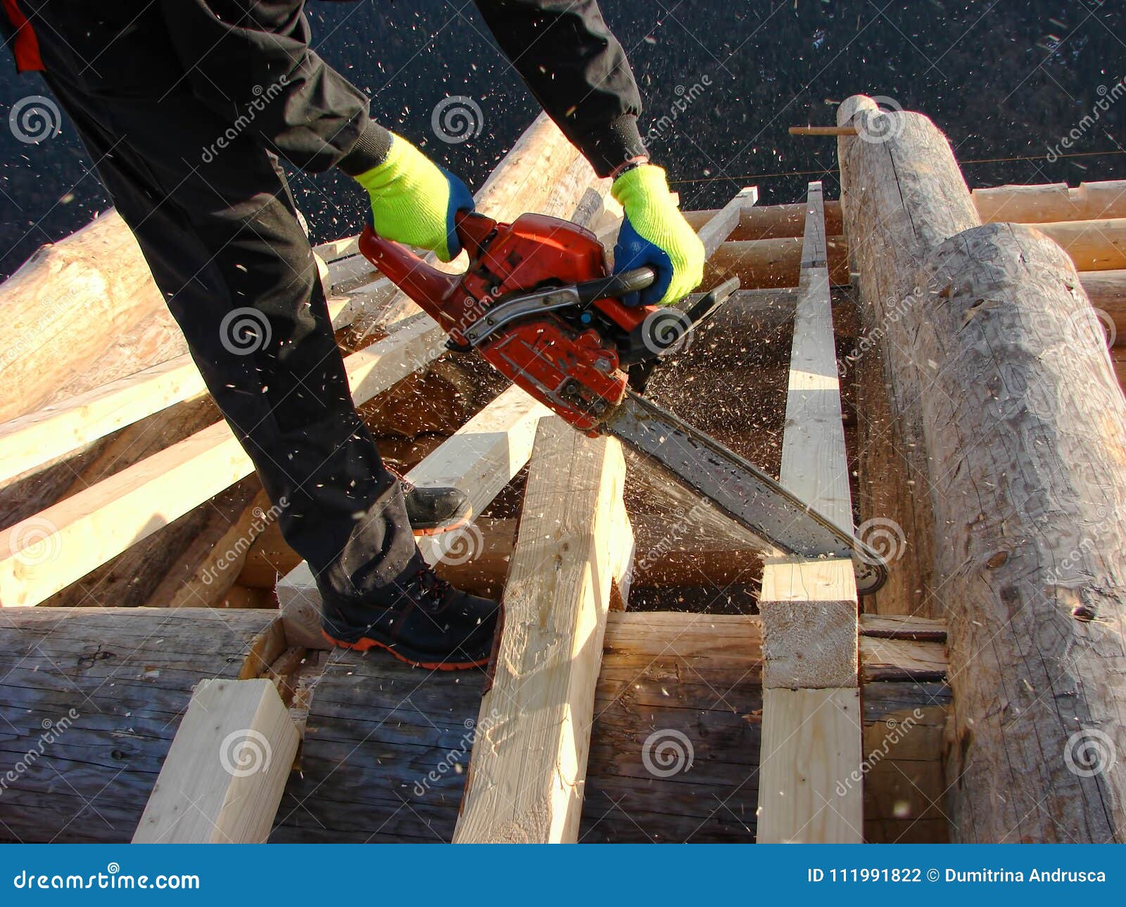 Carpenter working at cabin stock photo. Image of reconstruction - 111991822