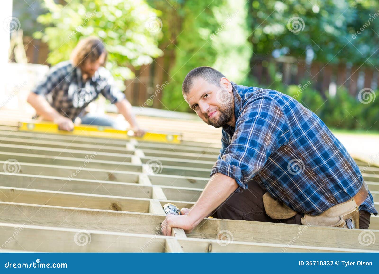 Carpenter Working at Construction Site Stock Photo - Image of build ...