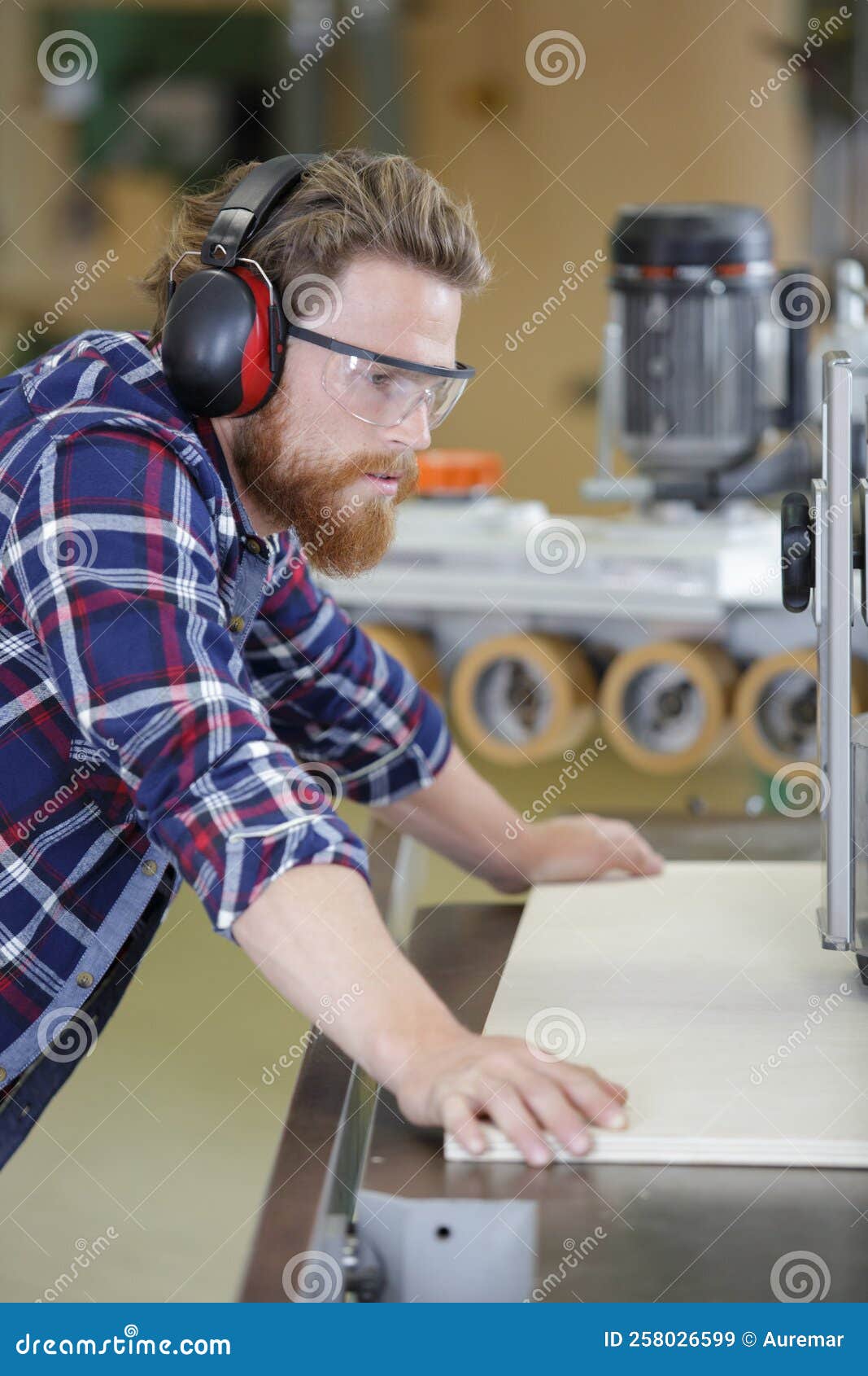 Carpenter Working on Electric Buzz Saw Cutting Boards Stock Image ...