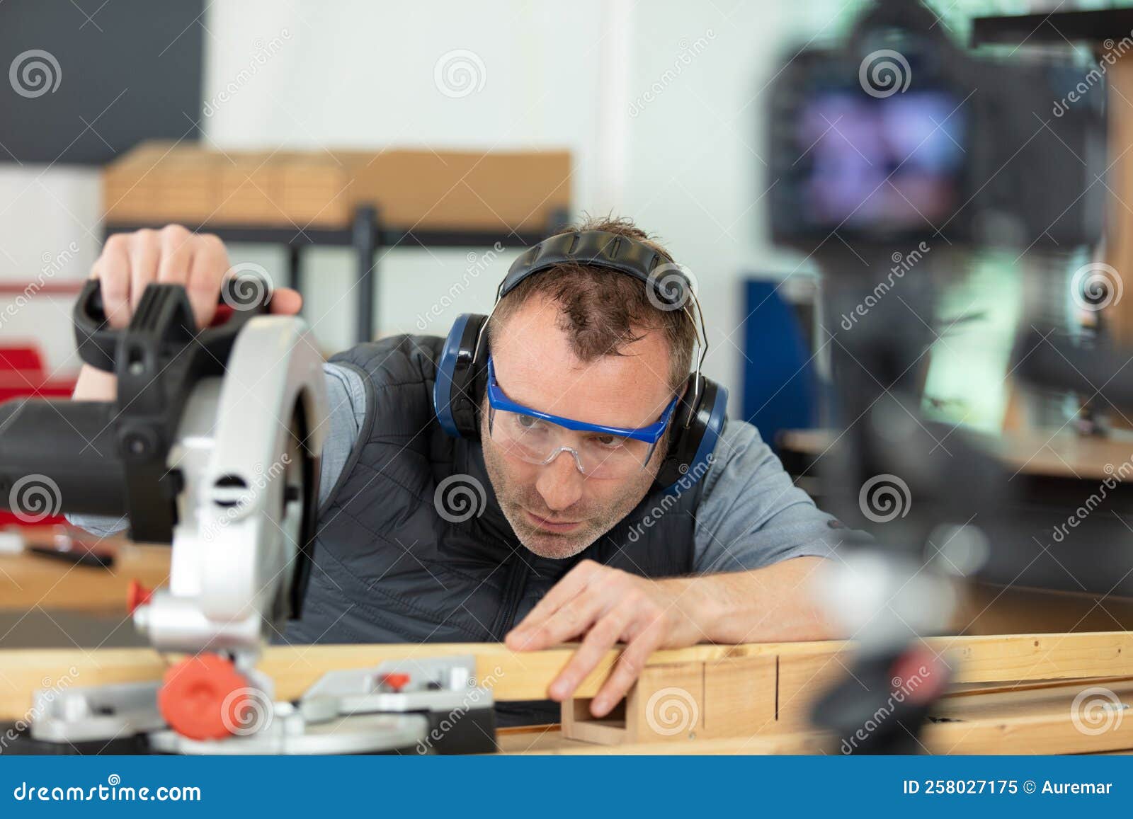 Carpenter Working on Electric Buzz Saw Cutting Boards Stock Image ...