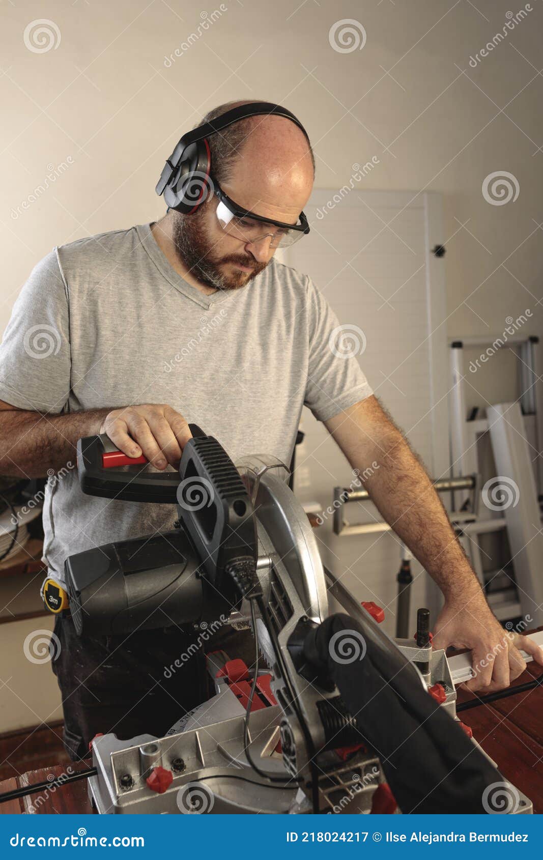 Carpenter Working with an Electric Cutting Machine, Circular Saw Stock ...